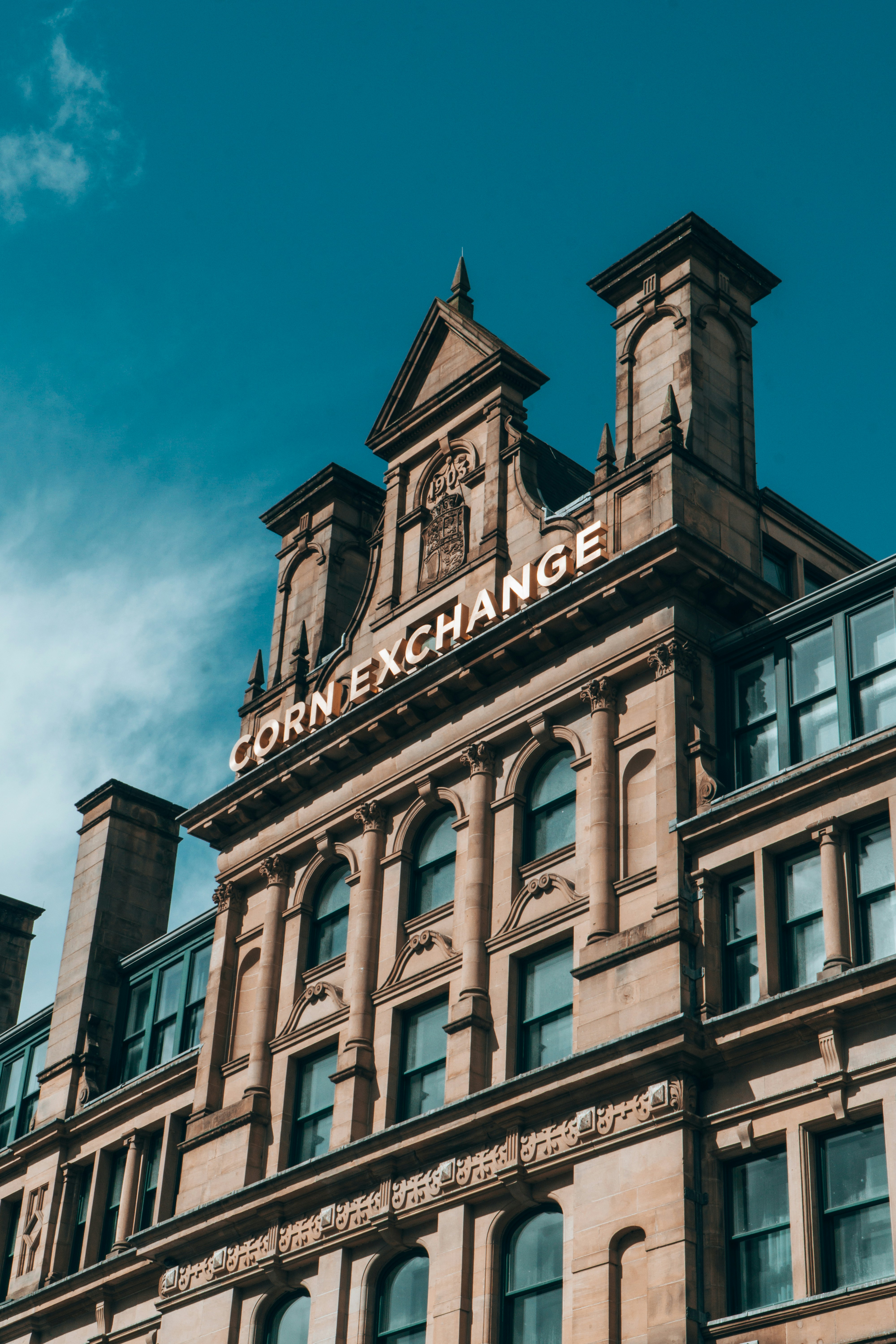 Cornerstone of Style: The Corn Exchange Facade Reaching Toward the Sky