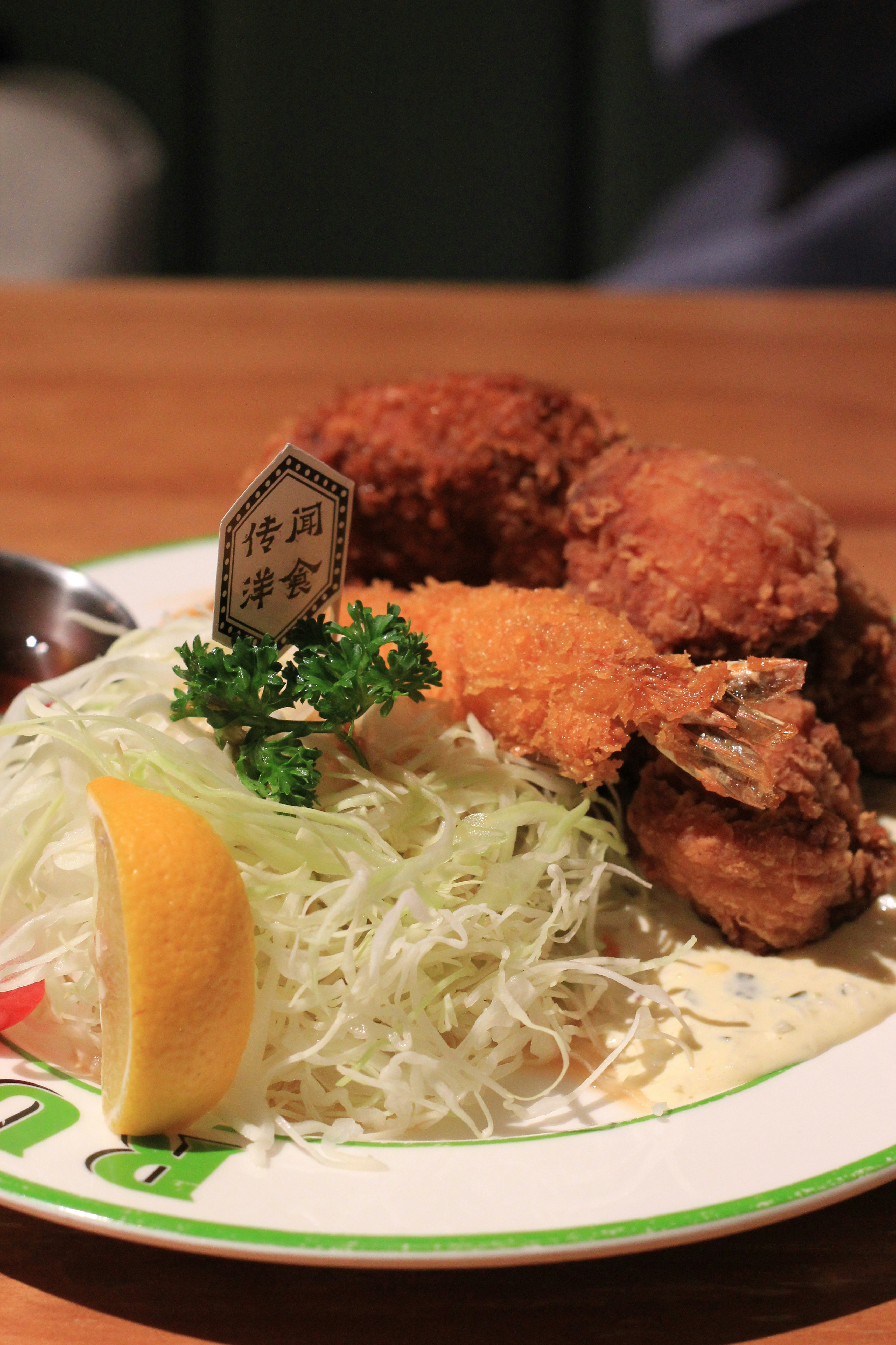 Crisped Fried Plate: A Tower of Juzo-Kara Fry with Shredded Cabbage and Lemon