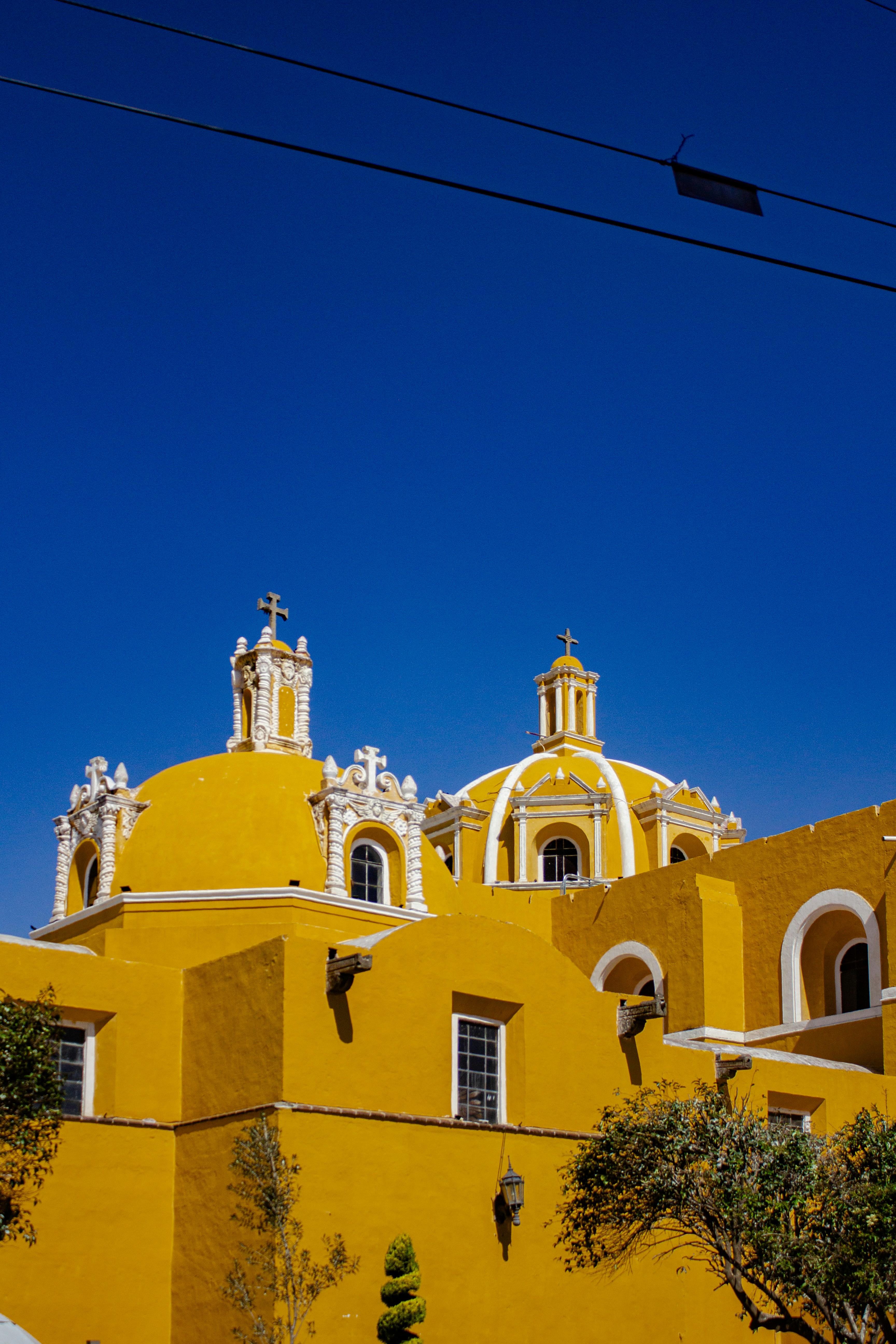 Golden Bell Towers Under a Cerulean Sky