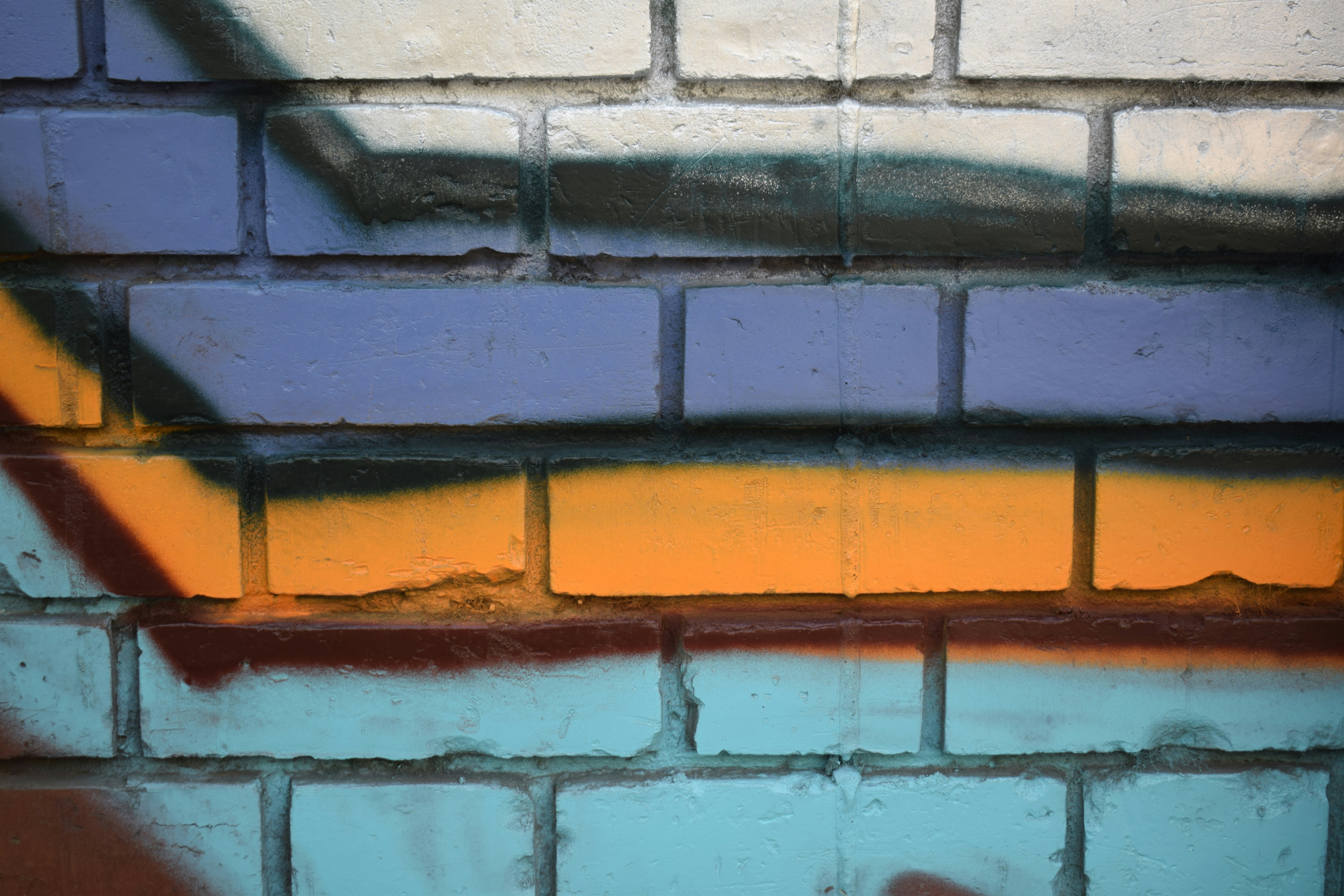 Chromatic Bricks: Neon Accents on a Weathered Canvas
