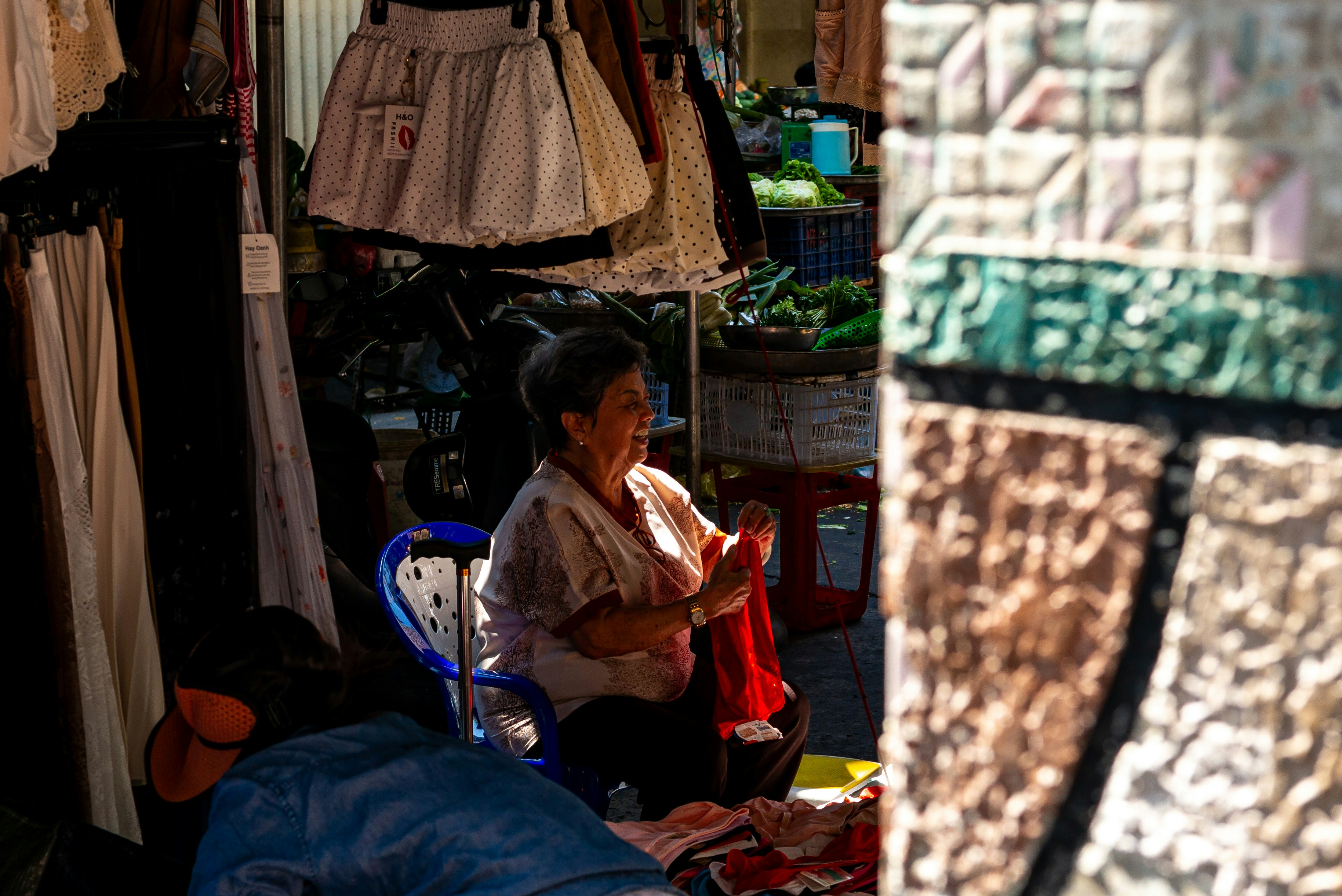 Market Portrait: The Elderly Seller in a Sunlit Corner