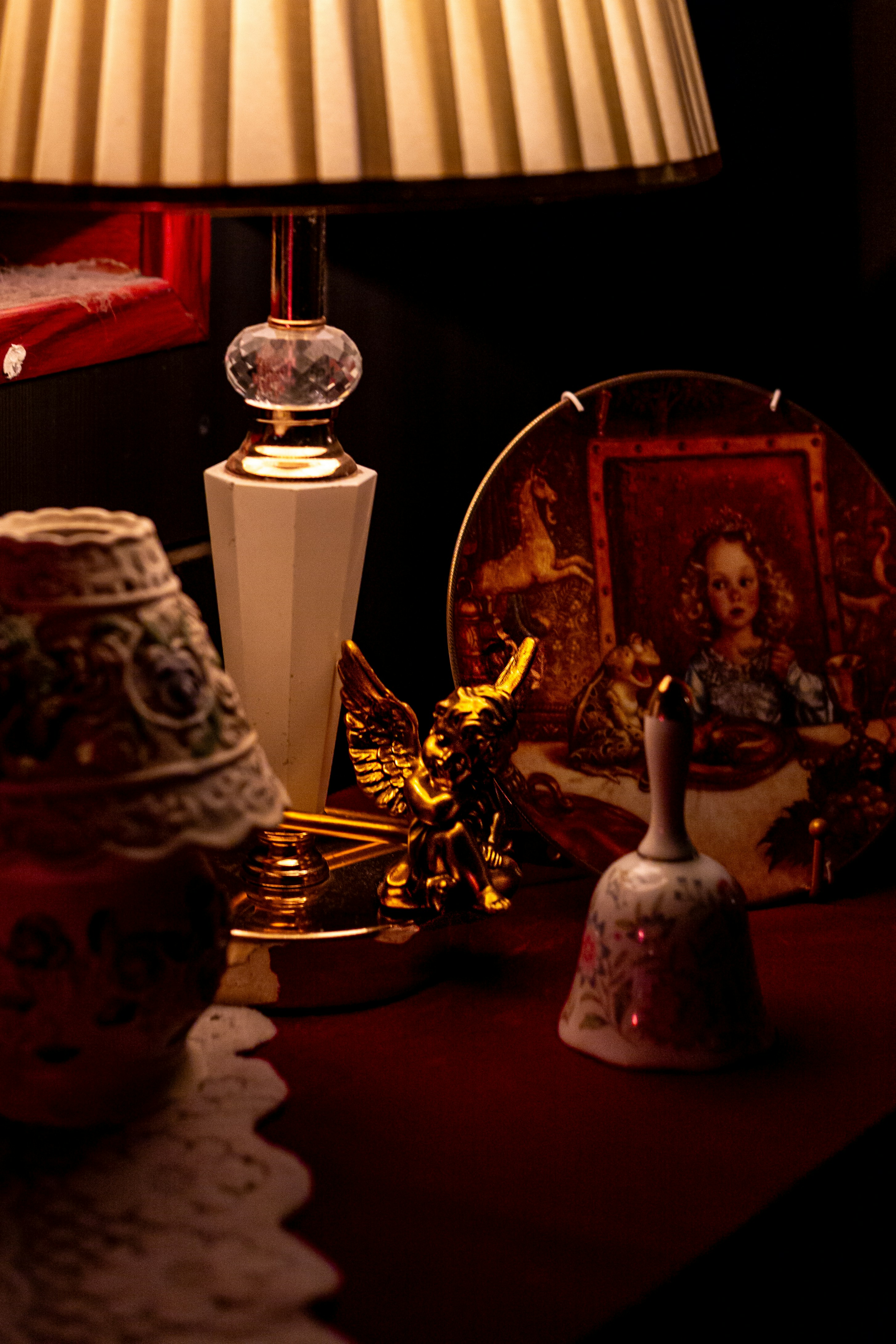 Dim Lanterns and Golden Angels: A Quiet Still Life of Trinkets