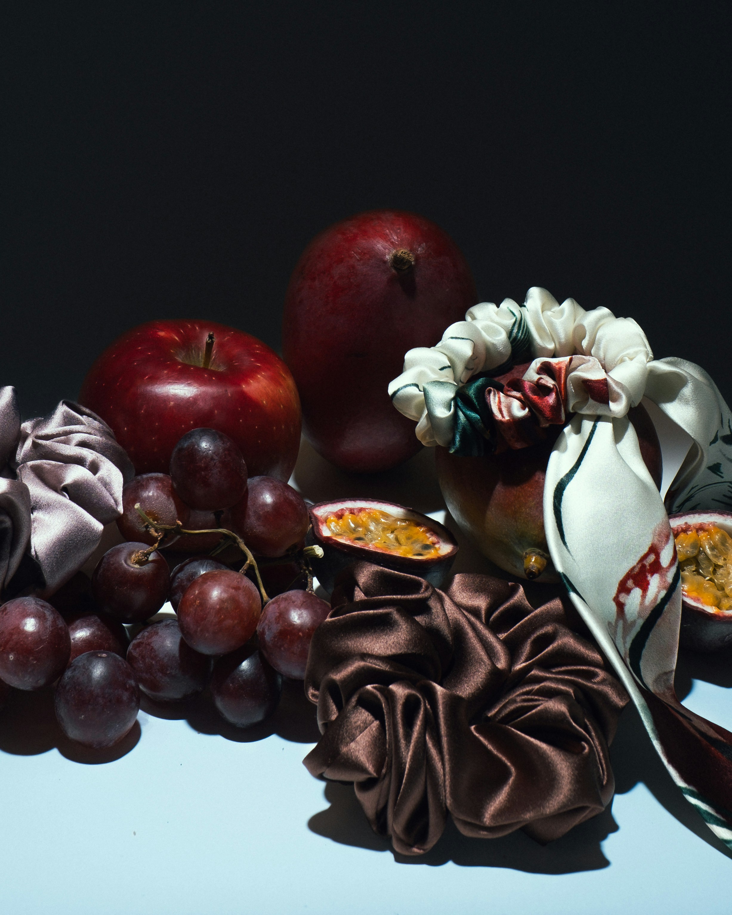 Grapes, Apples, and Silks: A Velvet-Shadowed still life