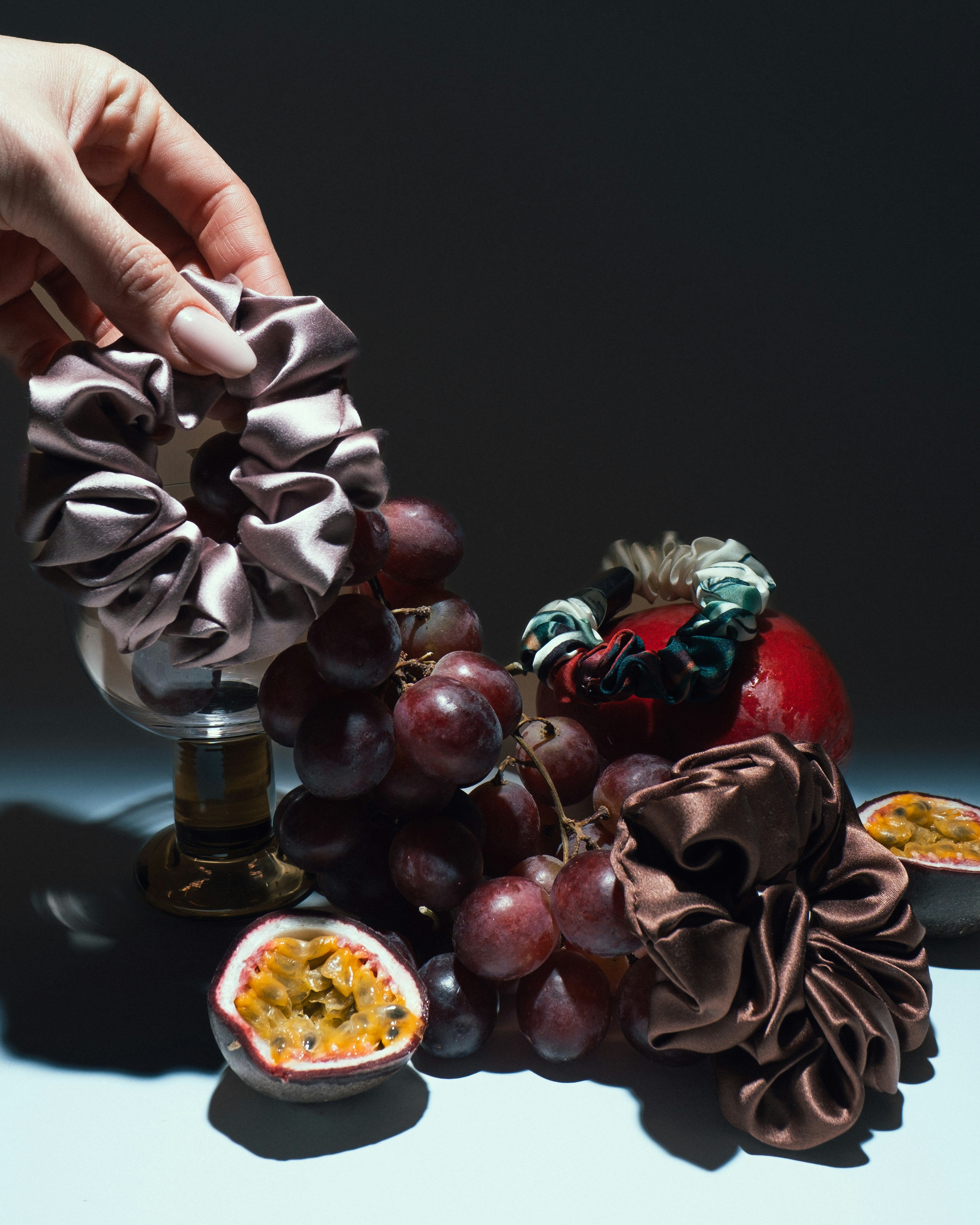 Silky Scrunchies and Grapes: A Quiet Still Life in Spotlight