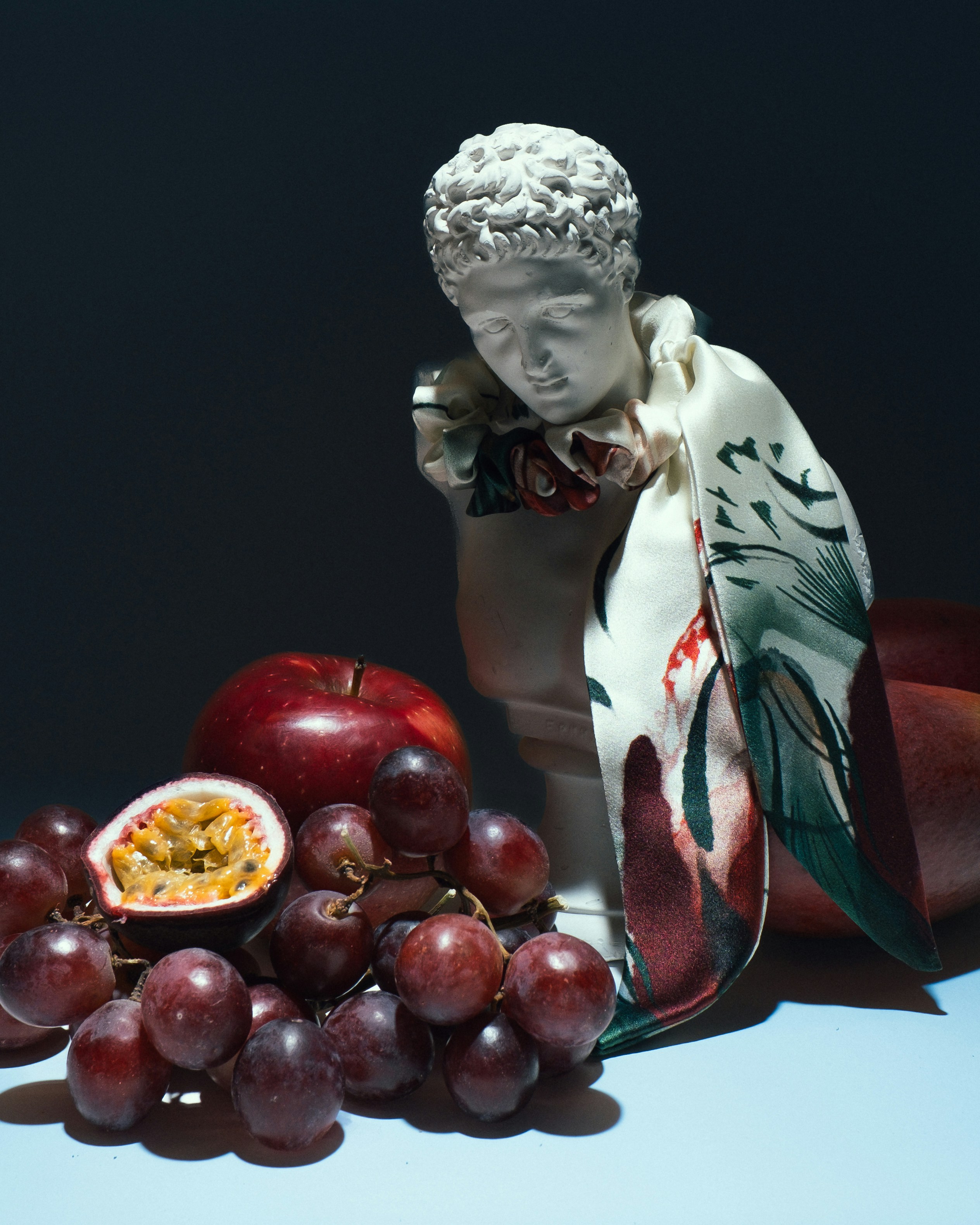 Statue under Draped Silk, Nestled Among Grapes and Passionfruit