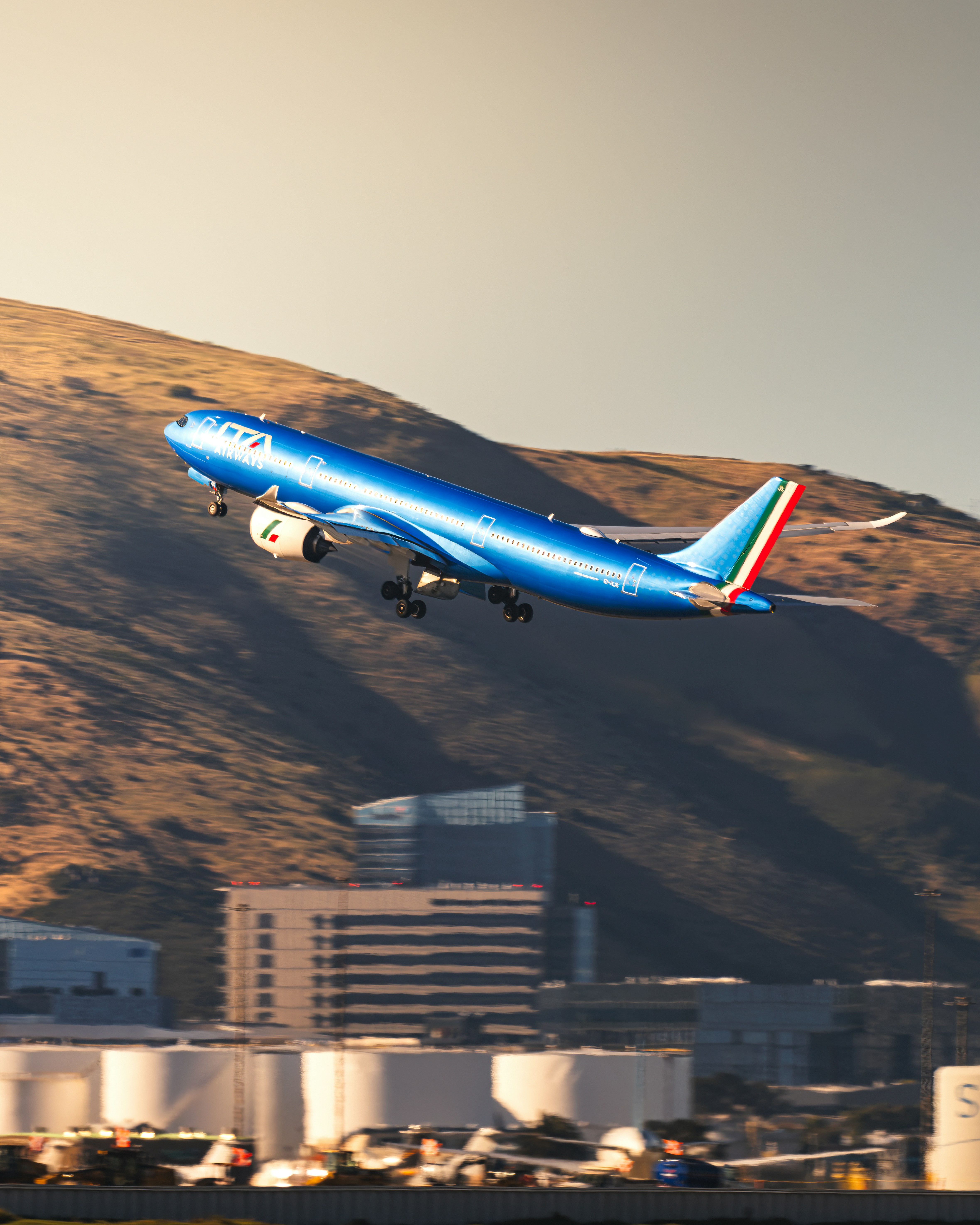 Blue Atlas: A Jet Leaps Above the Terminal Rim