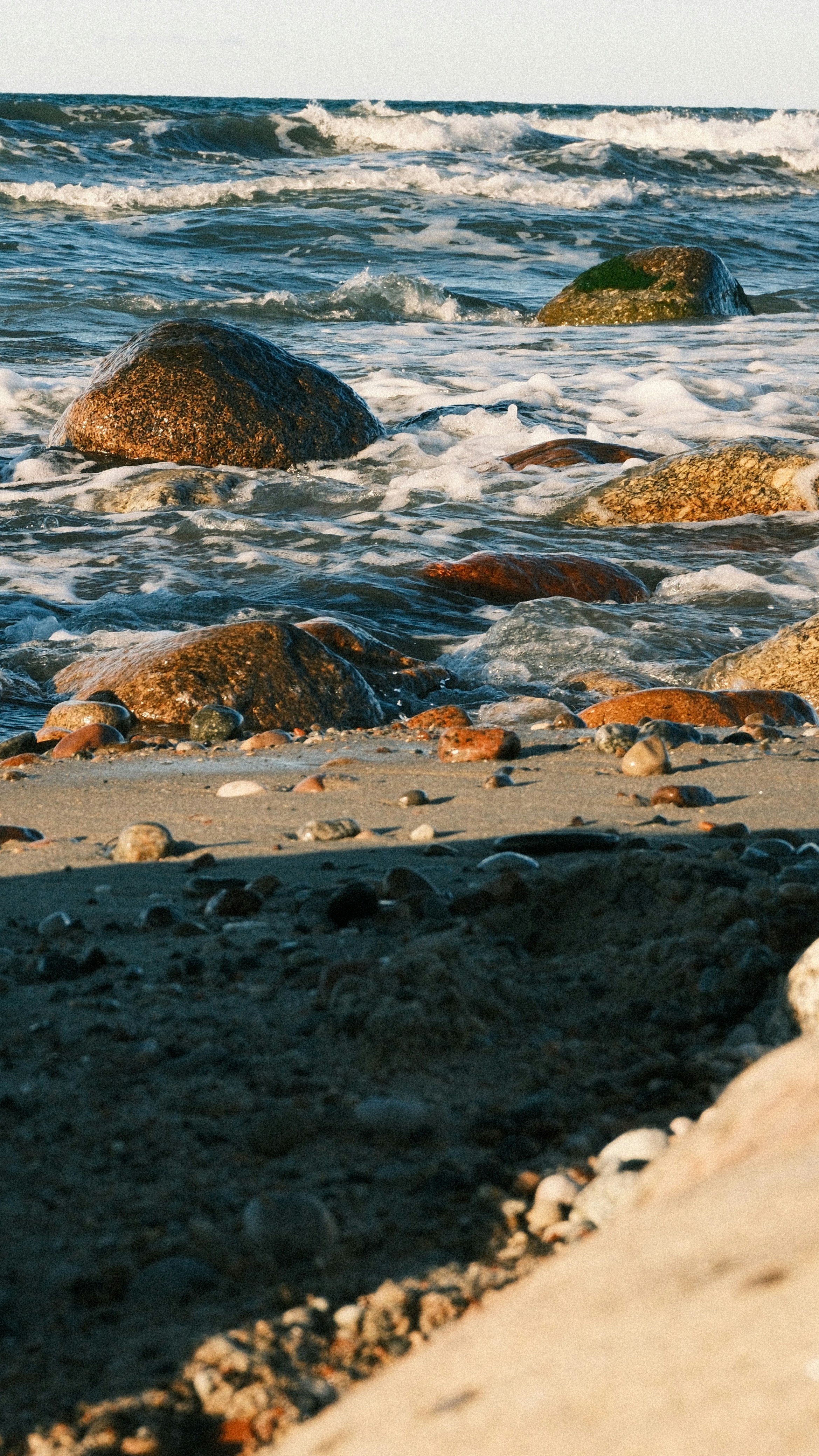 Low Tide Among Smooth Coastal Boulders