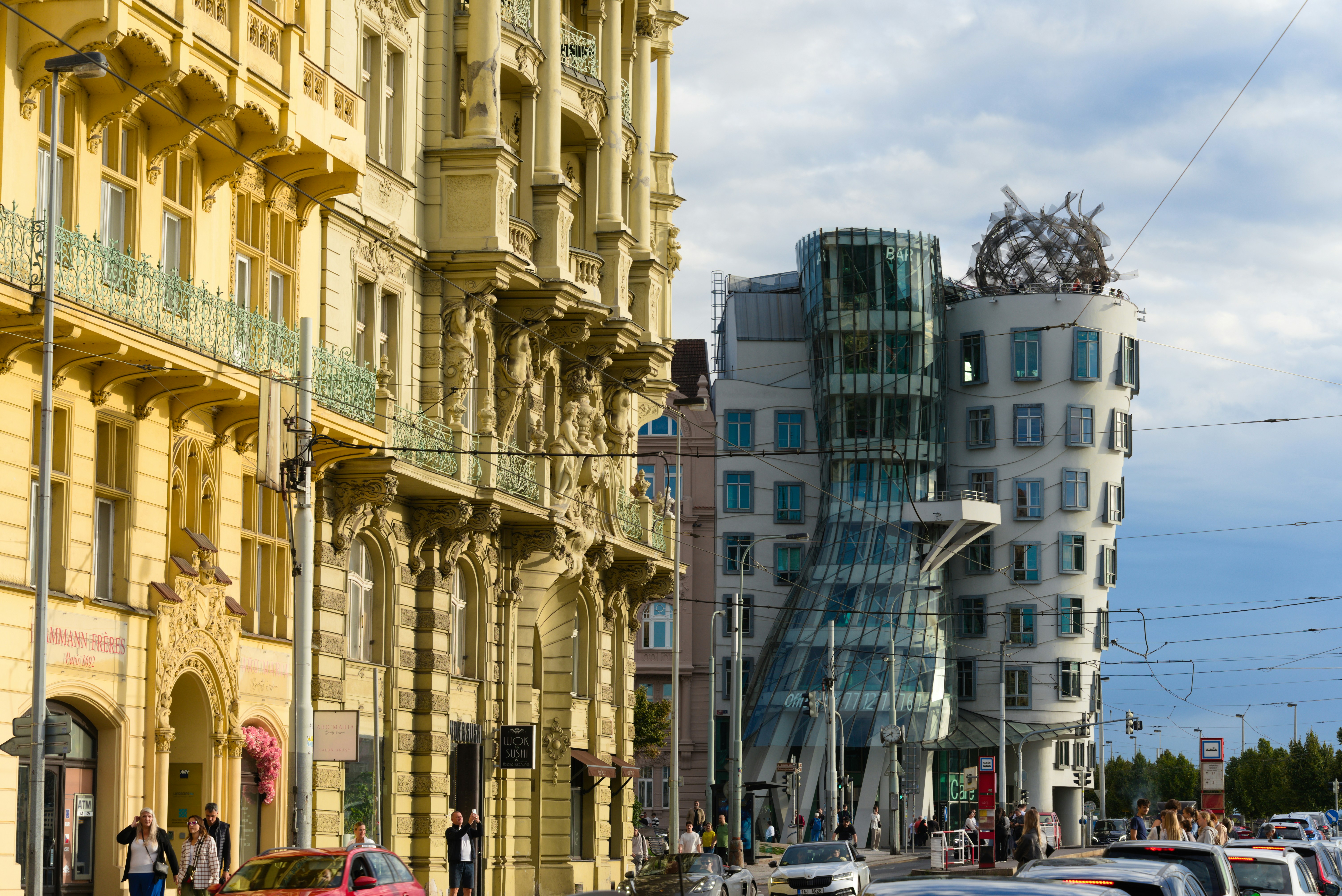 Streetside Duet: Historic Facades Meet Modern Curves