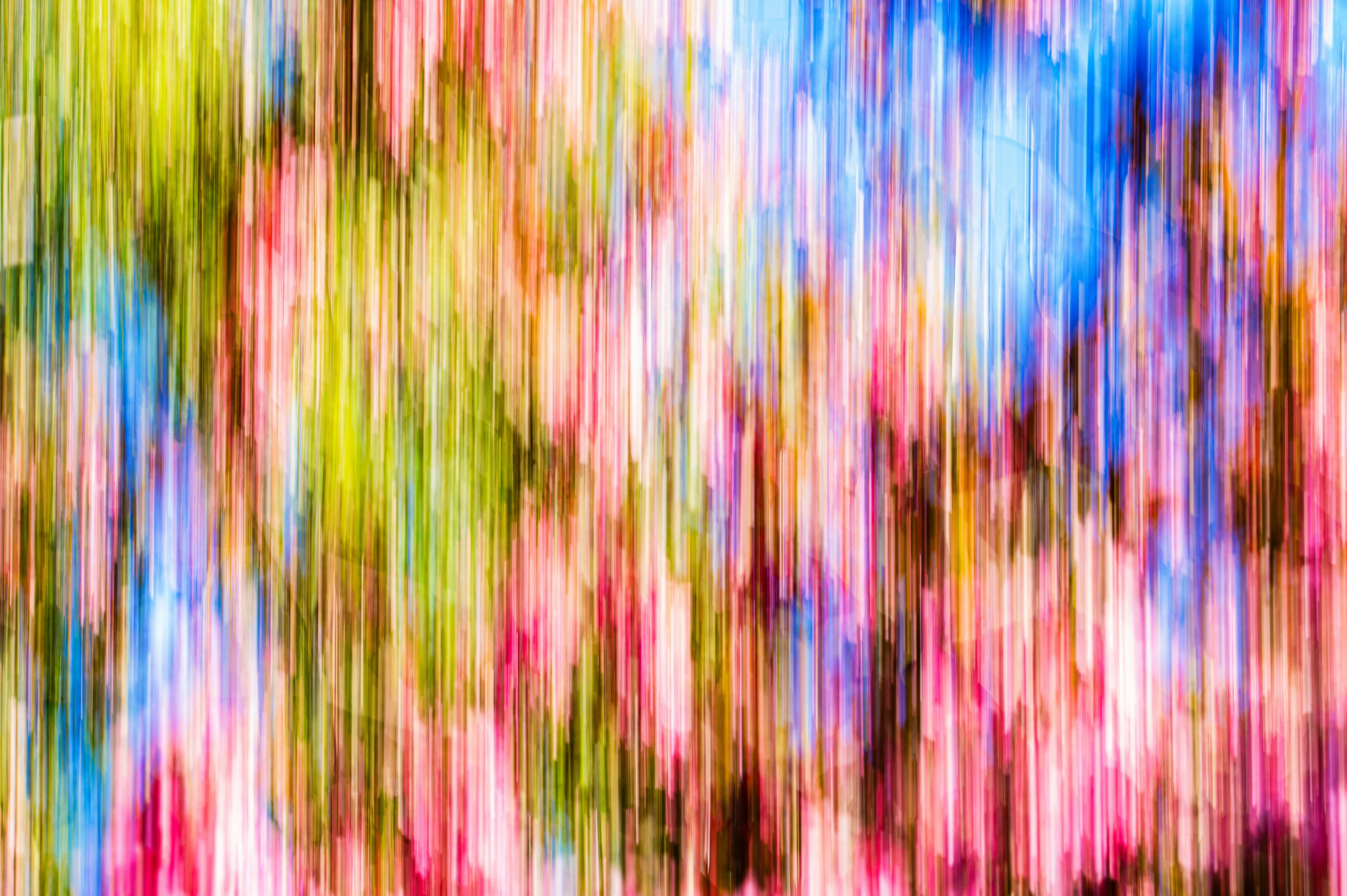 Chromatic Veil: Vertical Strokes in a Kaleidoscopic Blur