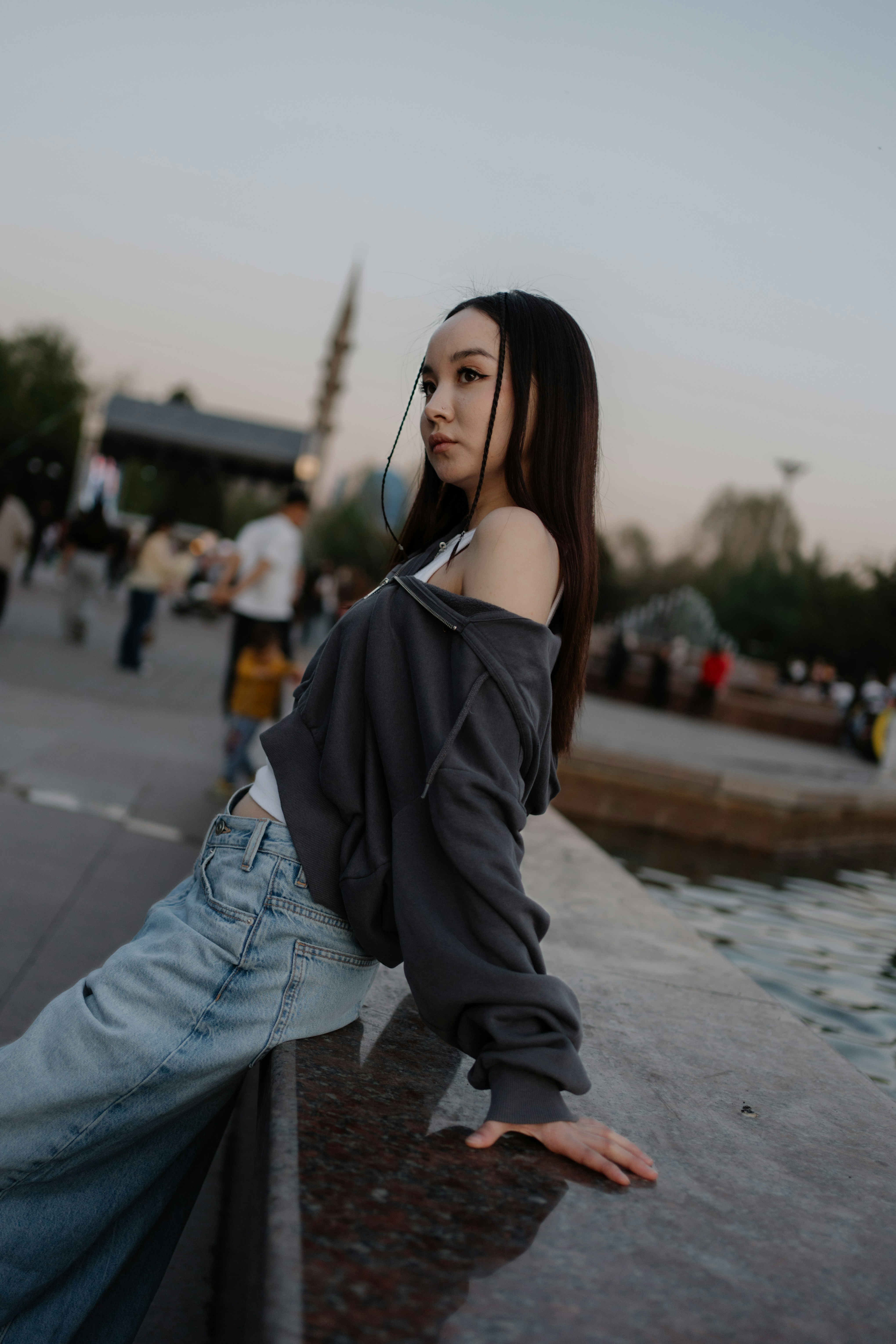 Sidelit Portrait by the Water: Quiet Confidence