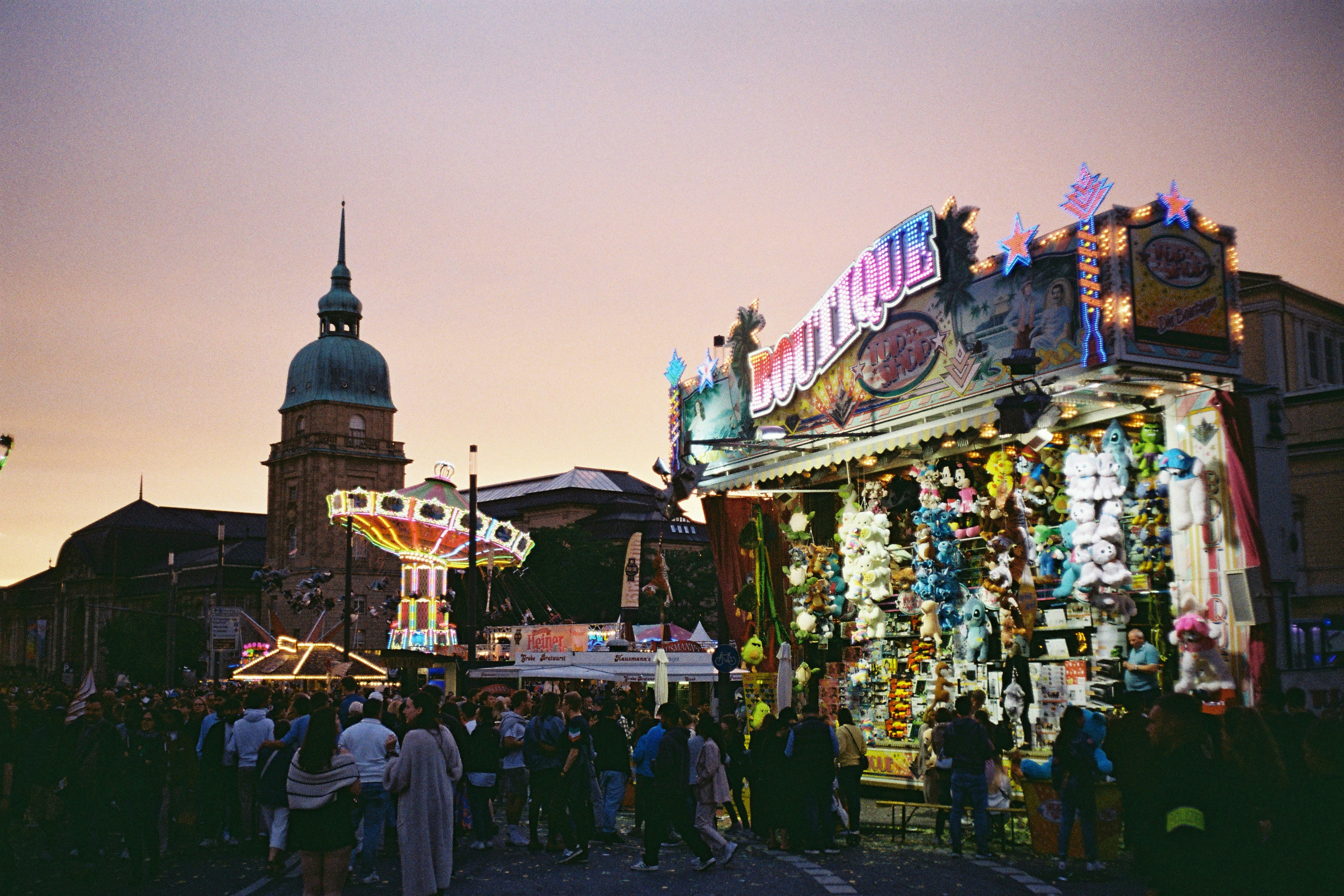 Carnival Orchard: Neon Games and Twilight Crowd