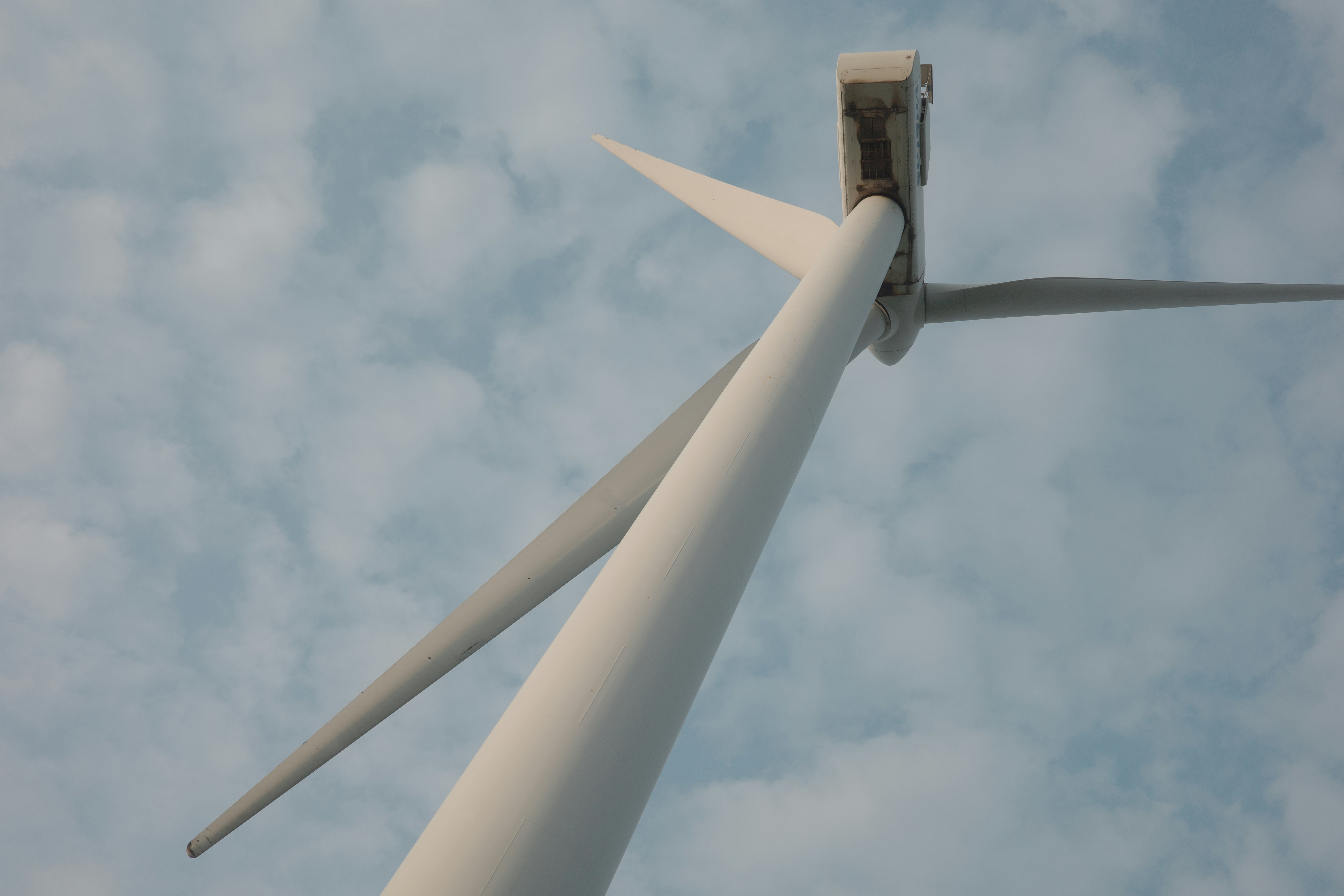 Skyward Giant: The Silent Tilt of a Wind Turbine