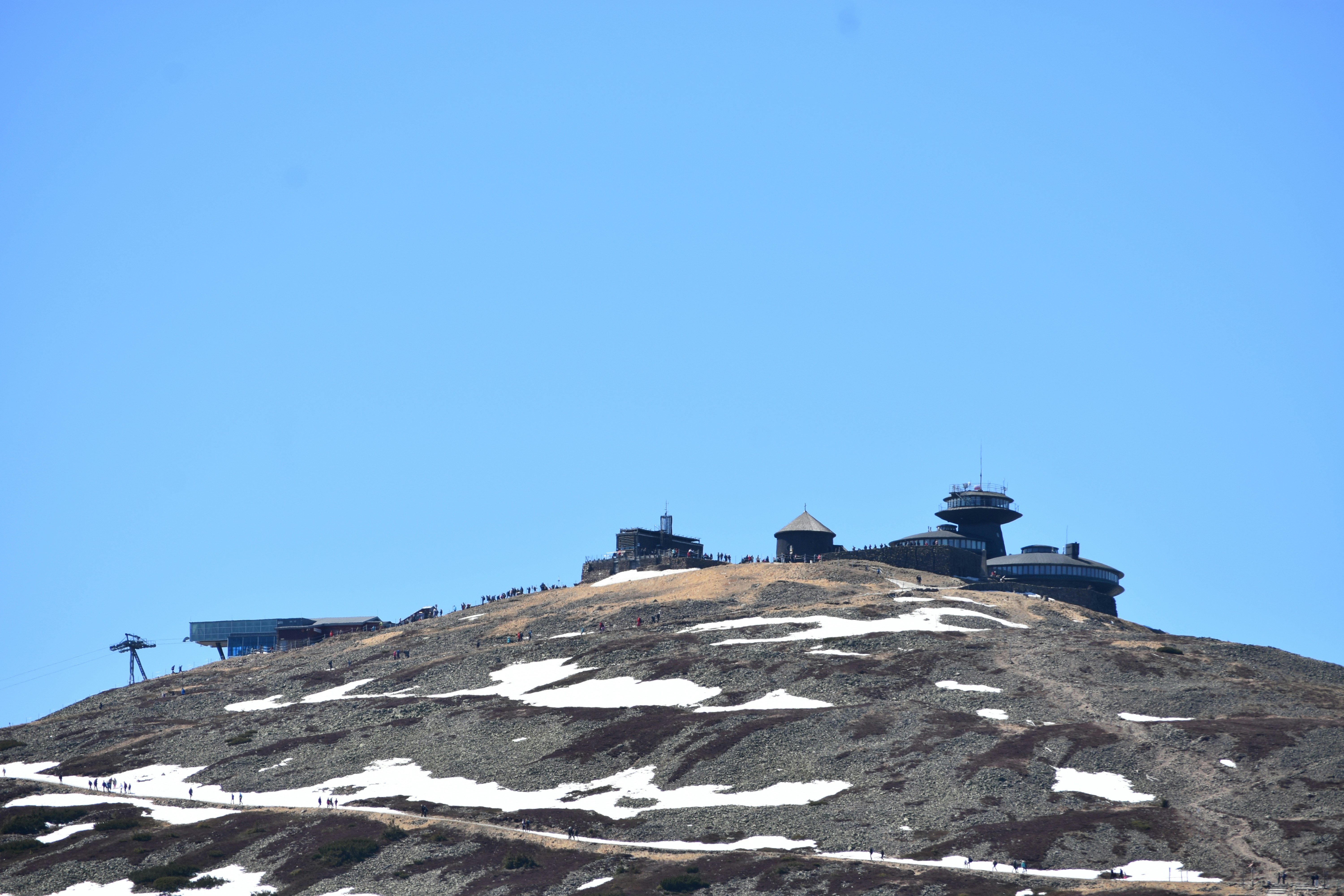 Hilltop Observatory Complex Under a Clear Blue Sky