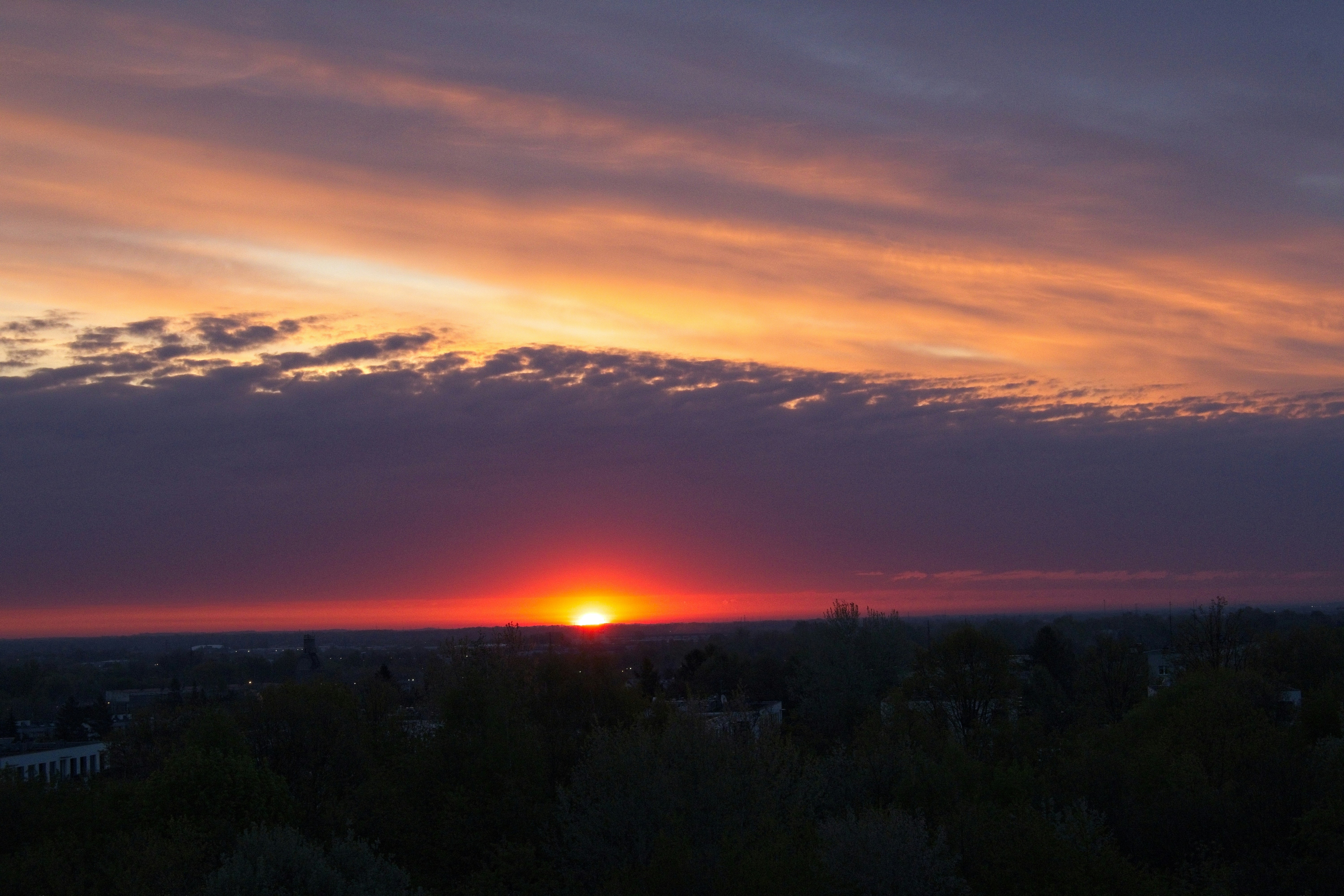 Sun Kissed Horizon: Quiet Dusk Over the Town