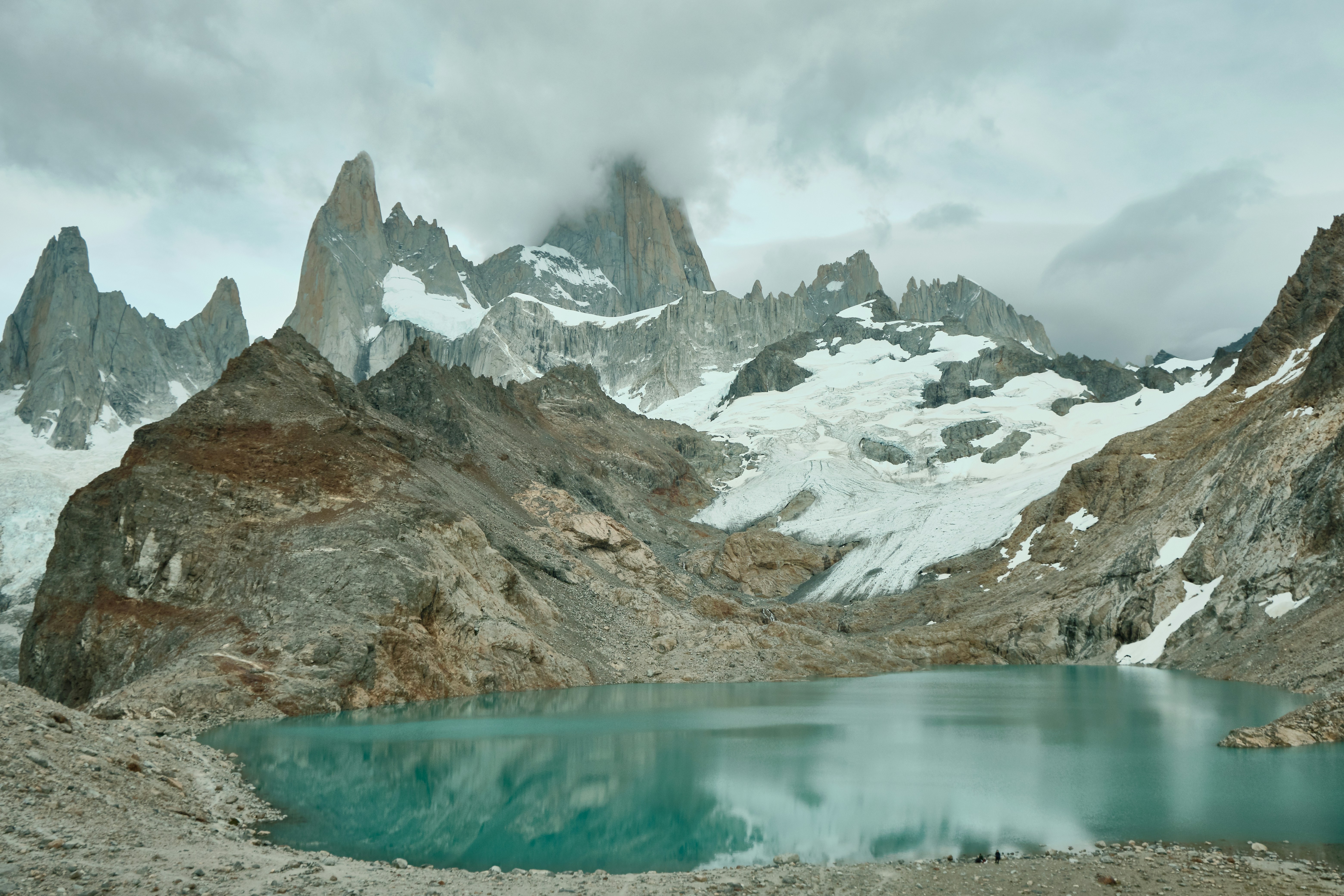Glacial Turquoise Mirror Beneath jagged Peaks