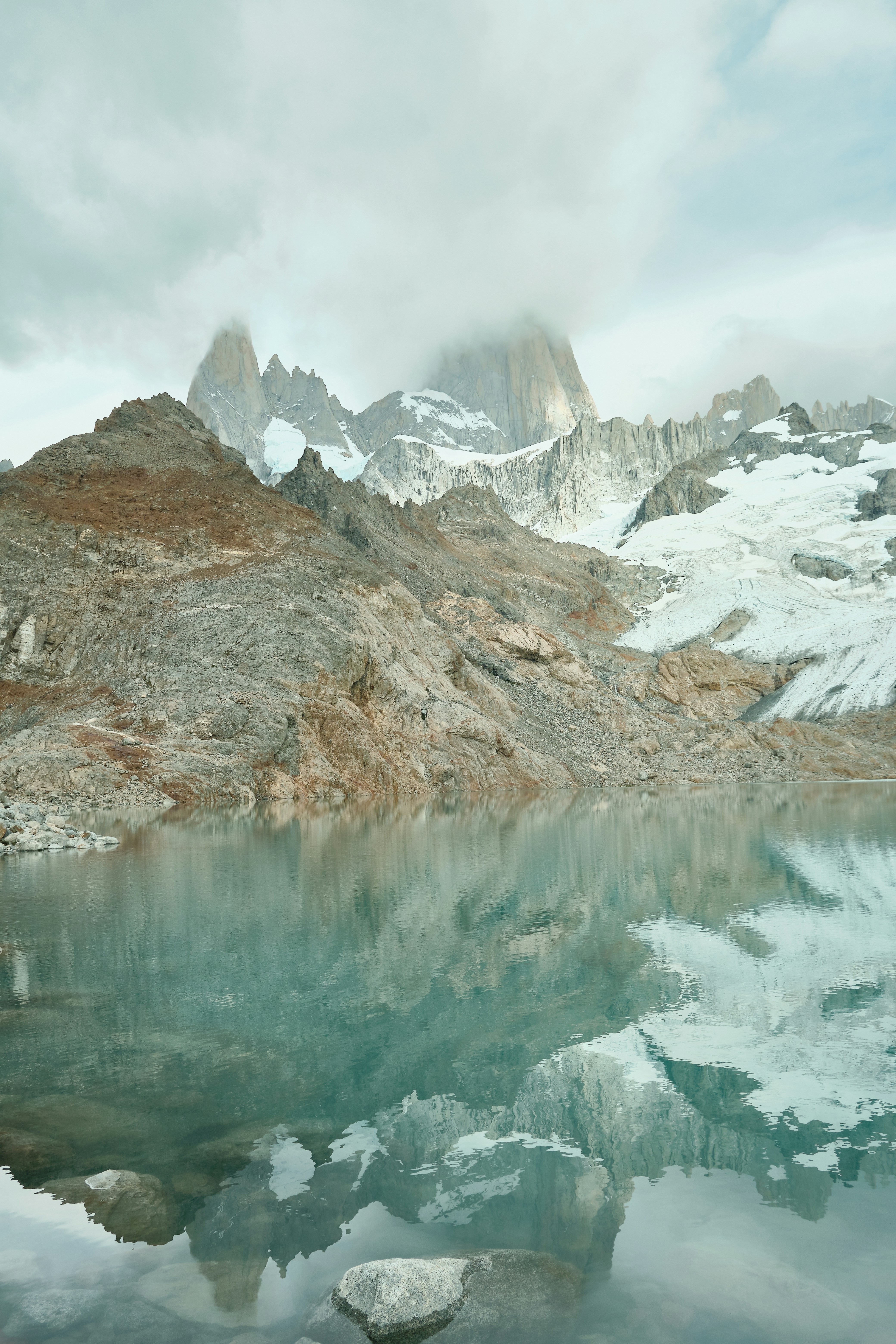 Glacial Peaks Over a Reflective Alpine Lake