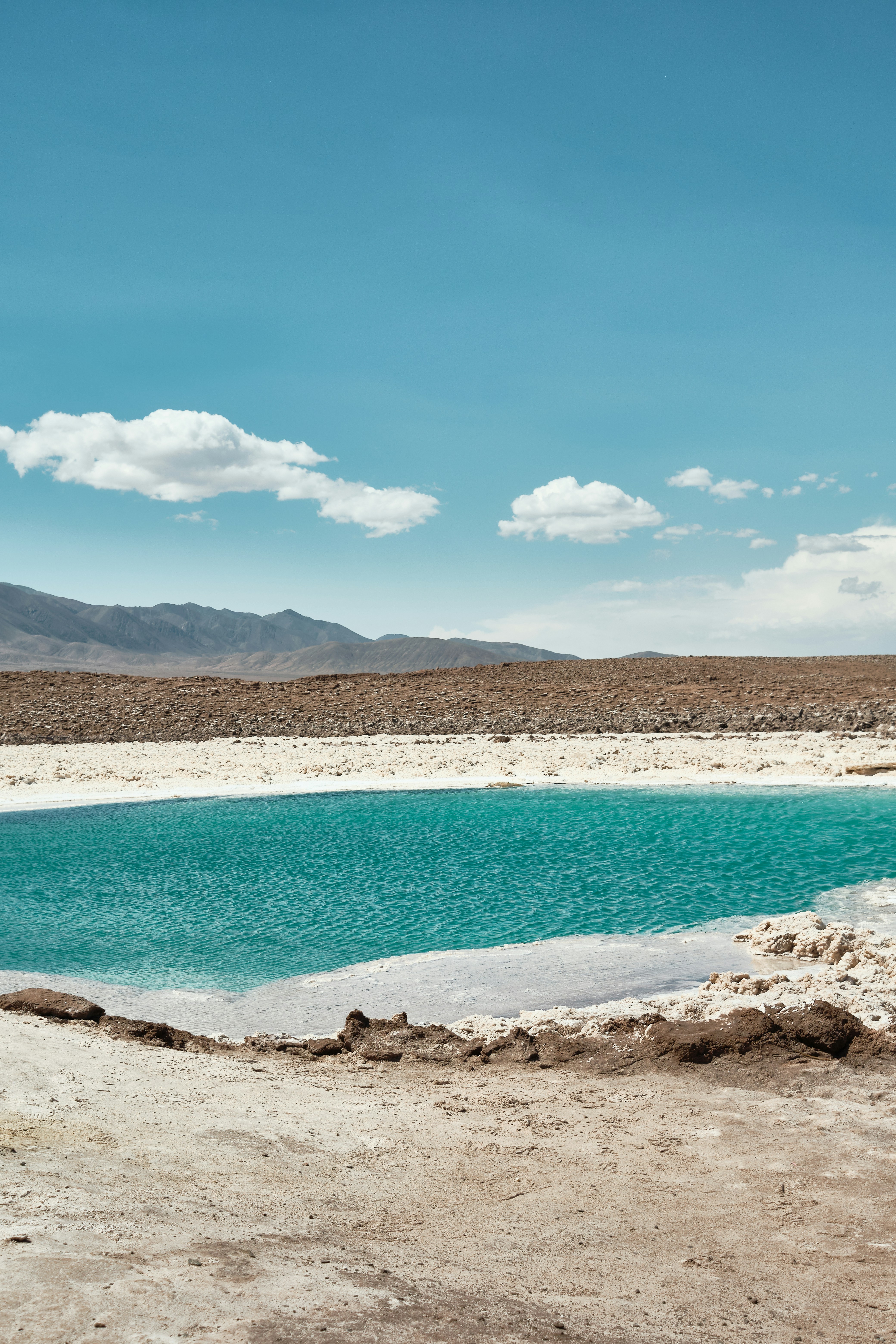 Azure Oasis at the Edge of Desert Hills