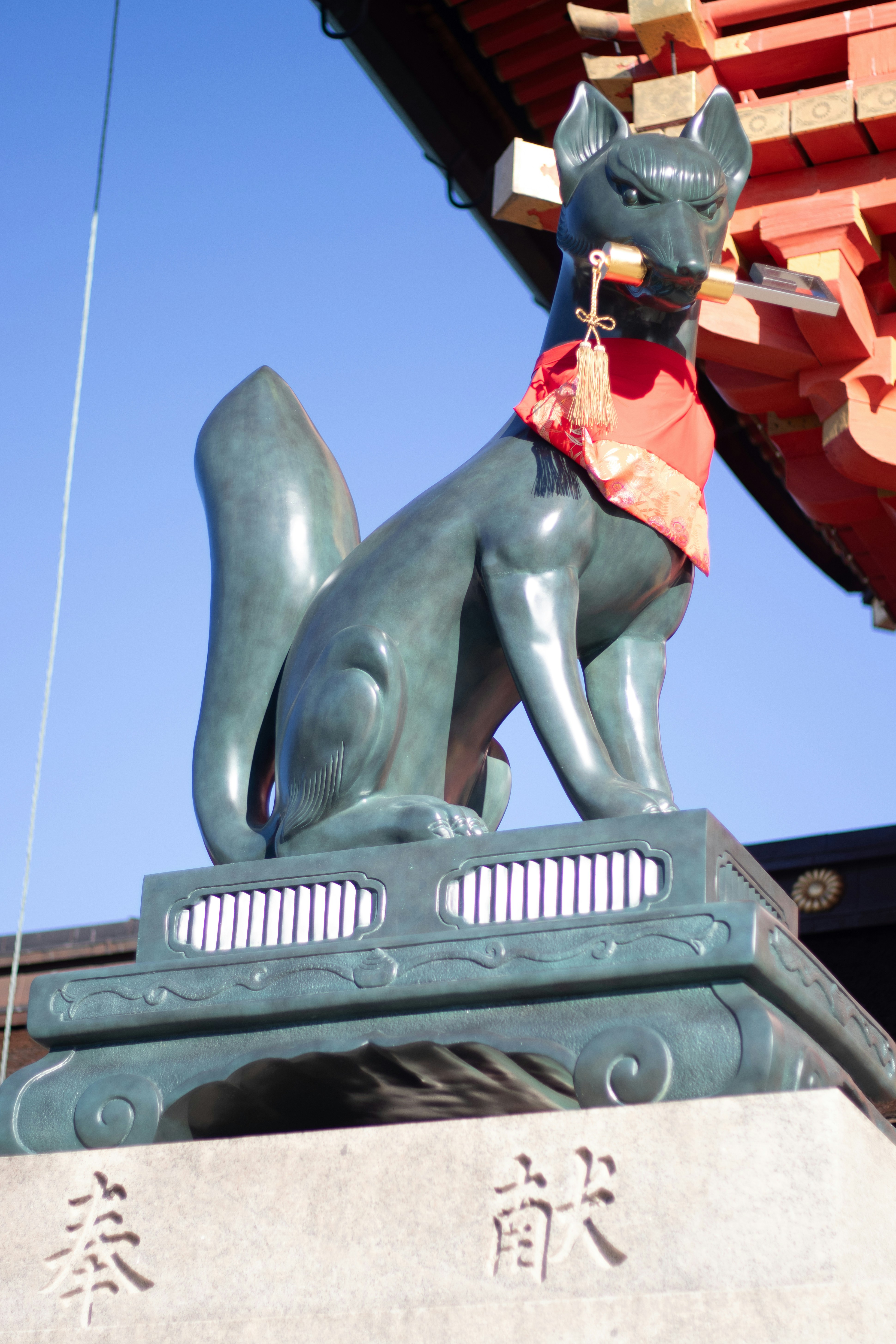 Loyal Guardian in Ceremonial Red at a Temple Entrance
