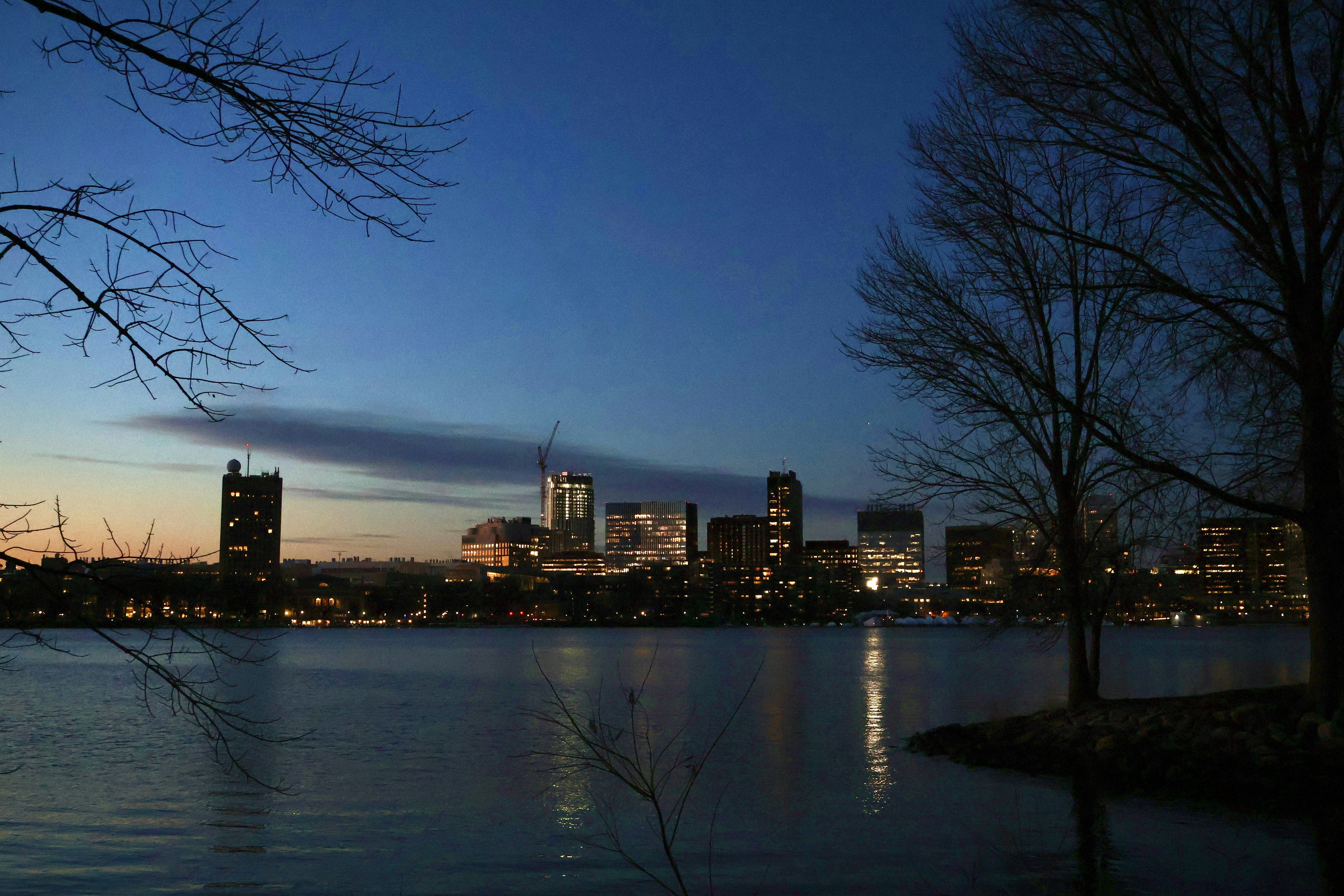 Twilight Skyline Reflections over a Quiet Lake