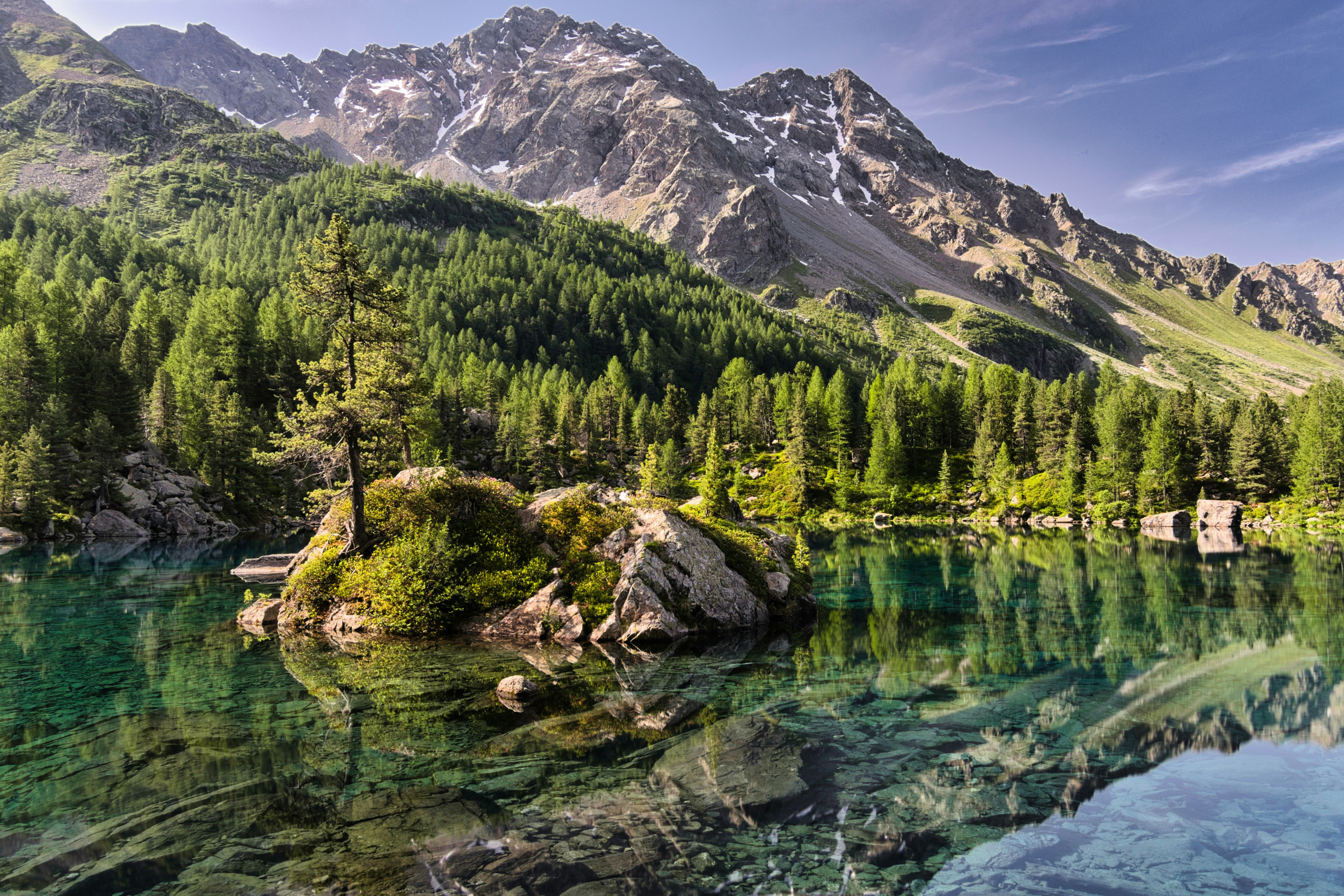 Emerald Mirror: A Mountain Lake Framed by Pine and Peak