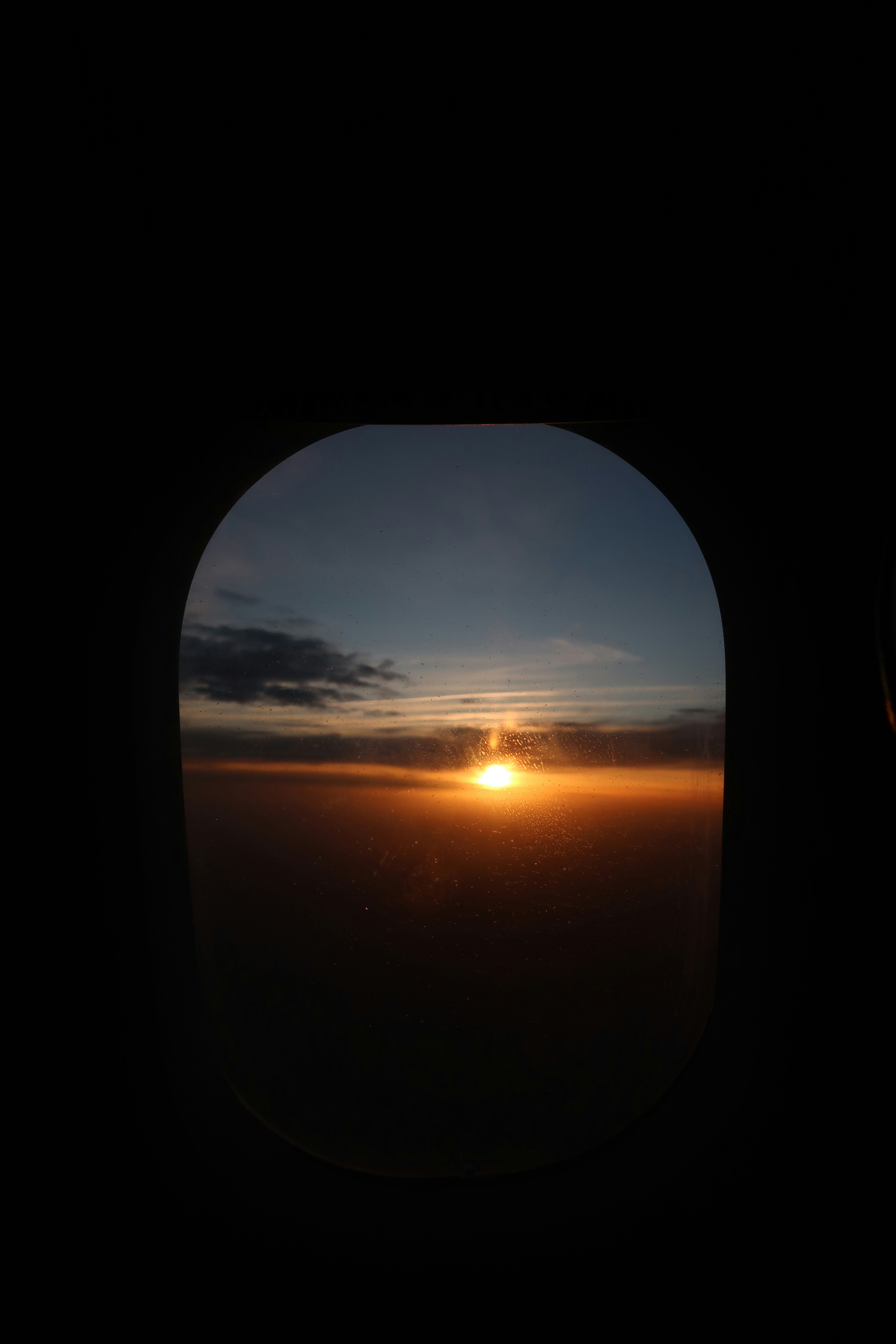 Sunset Window: A Horizon Through the Cabin Arc