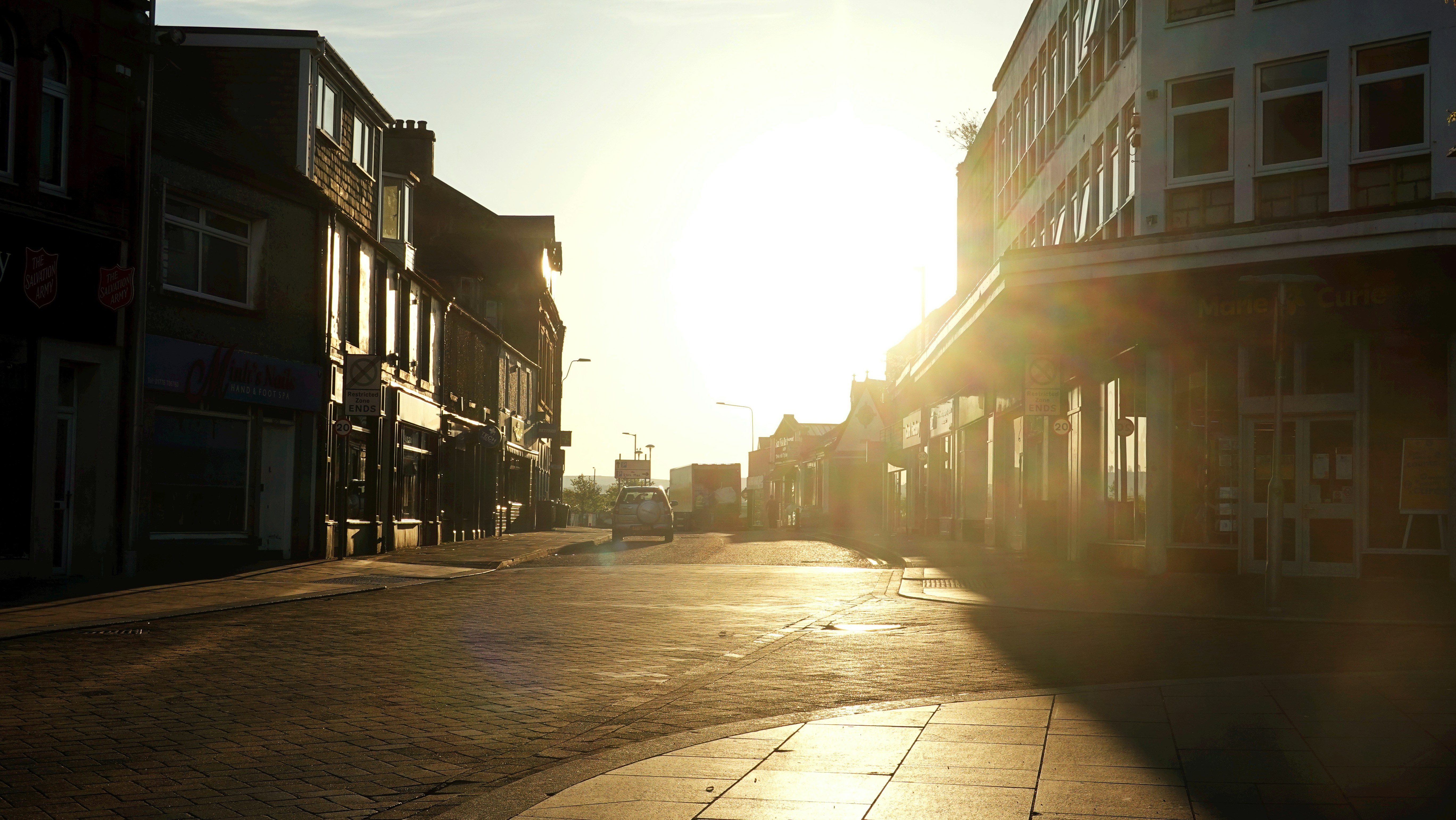 Morning Glare on an Empty Main Street