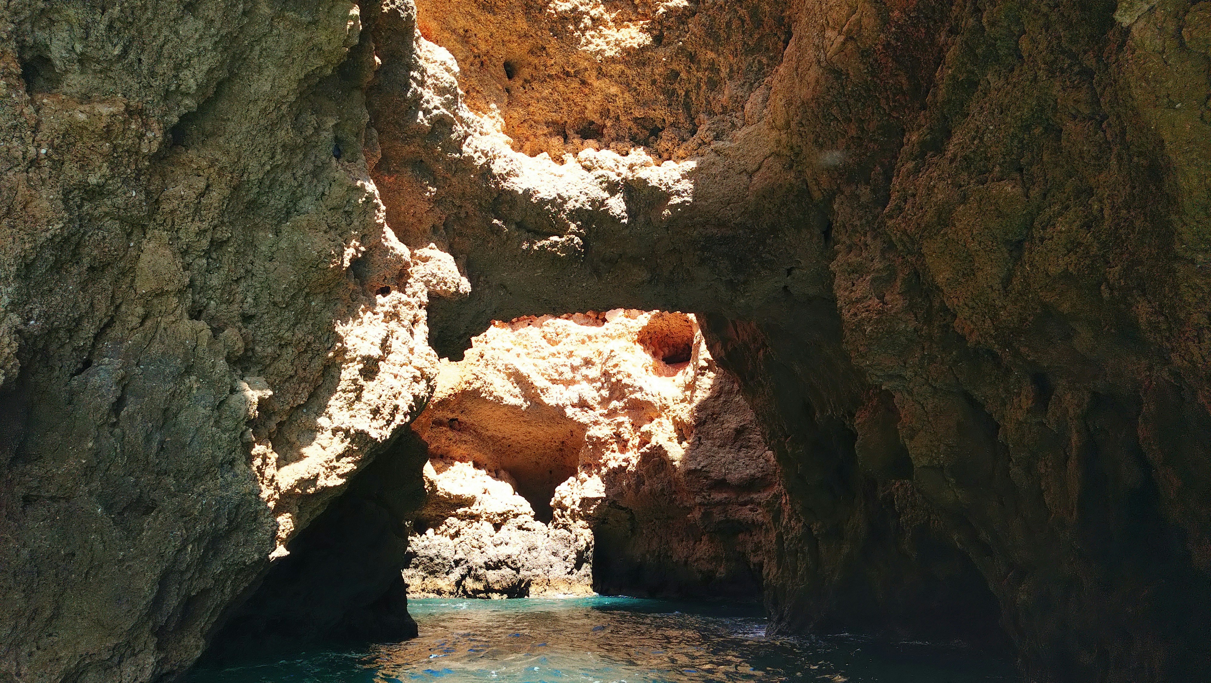 Sea-carved Archway Over Turquoise Waters