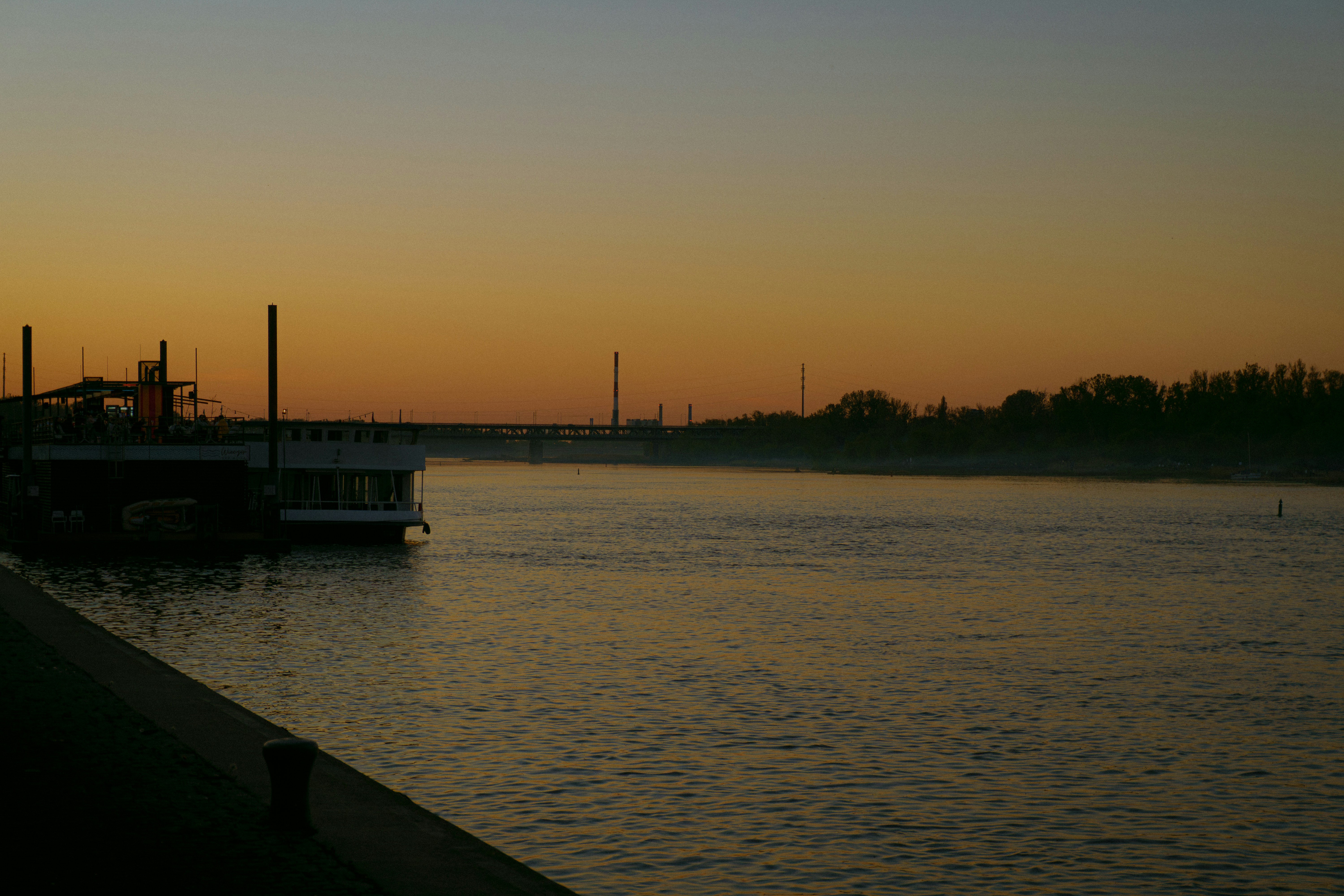 Sunset Ferry at the Quiet Riverbend