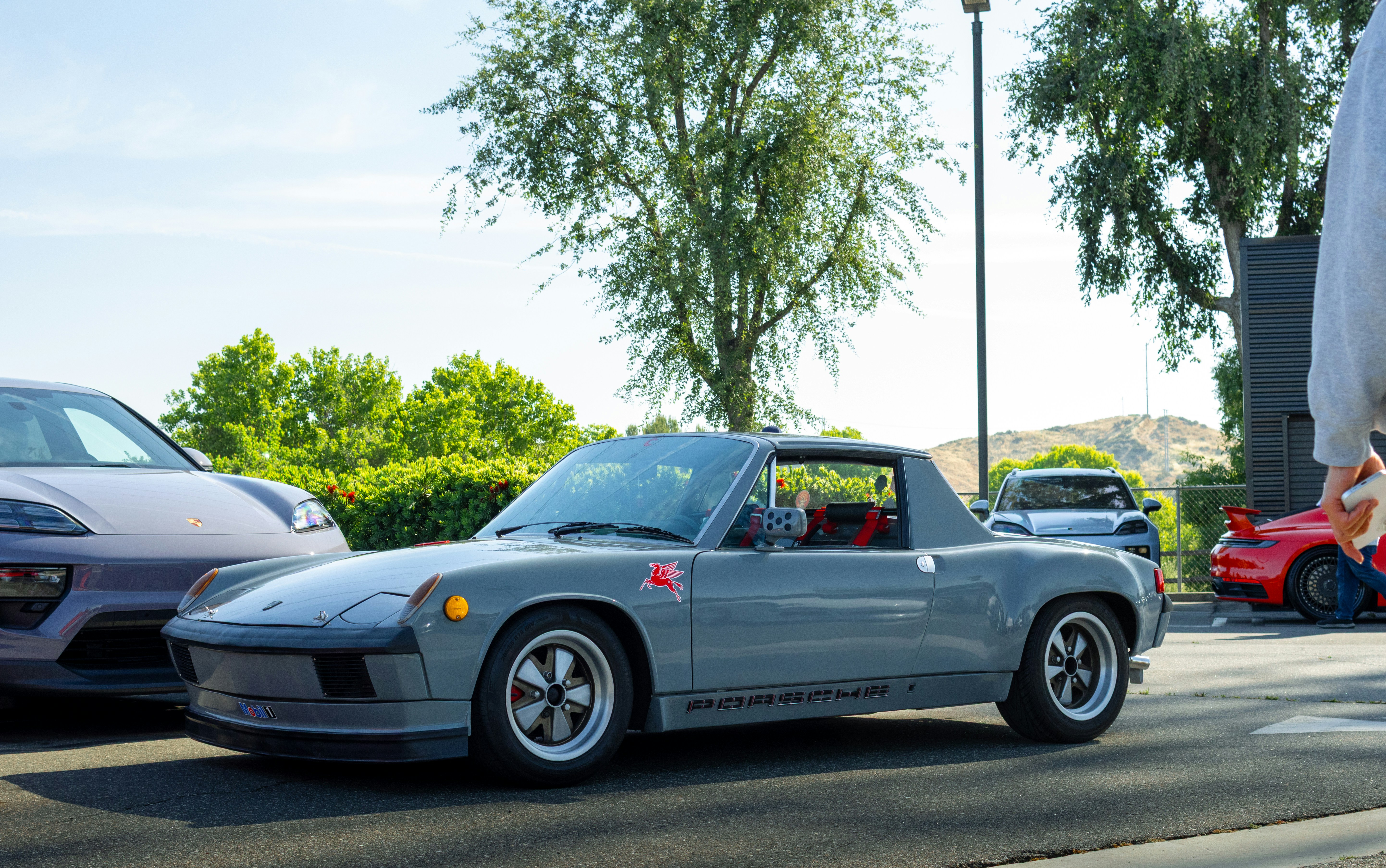 Blue Porsche Convertible in a Car Show Row