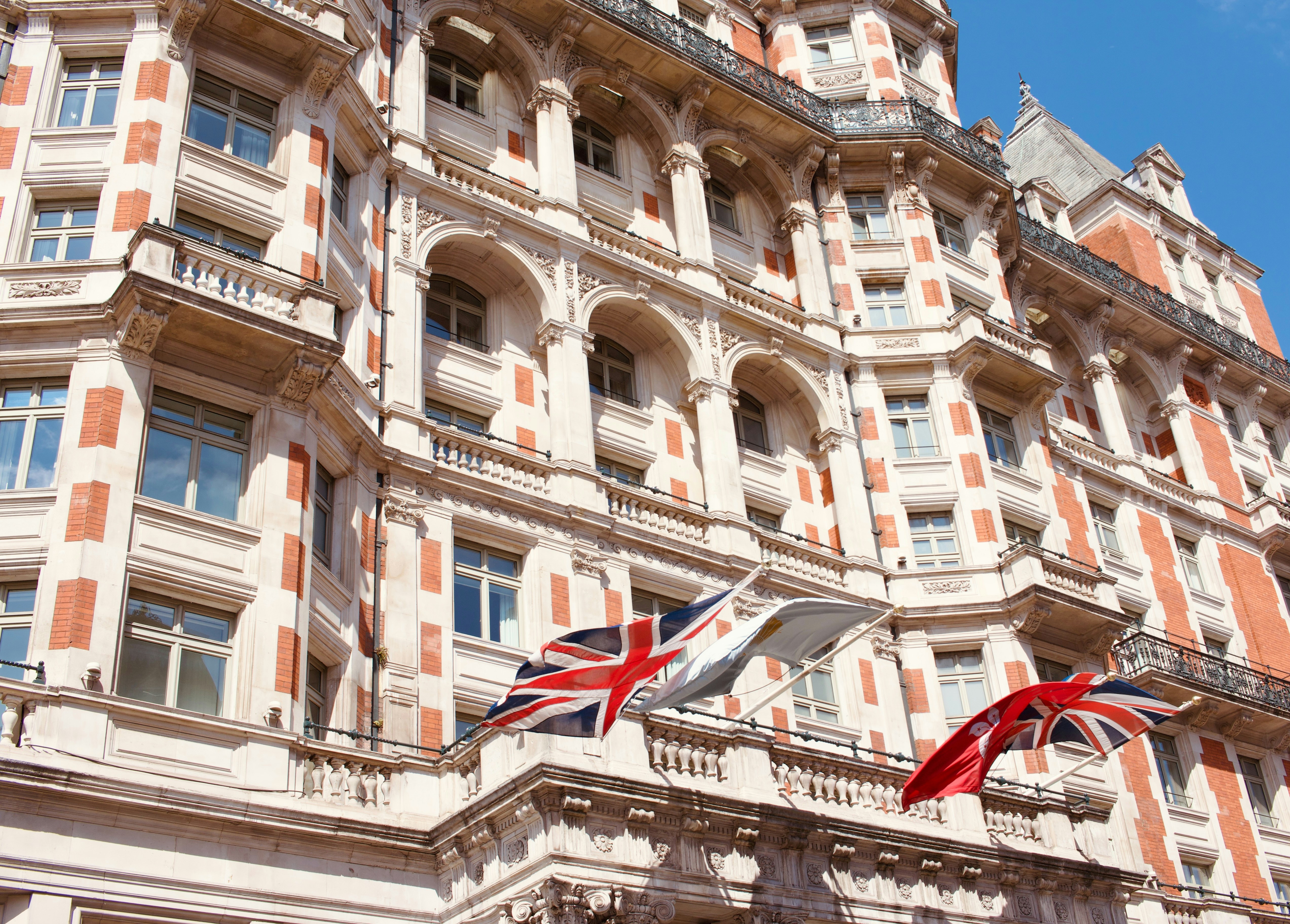 Flags Over a Victorian Facade
