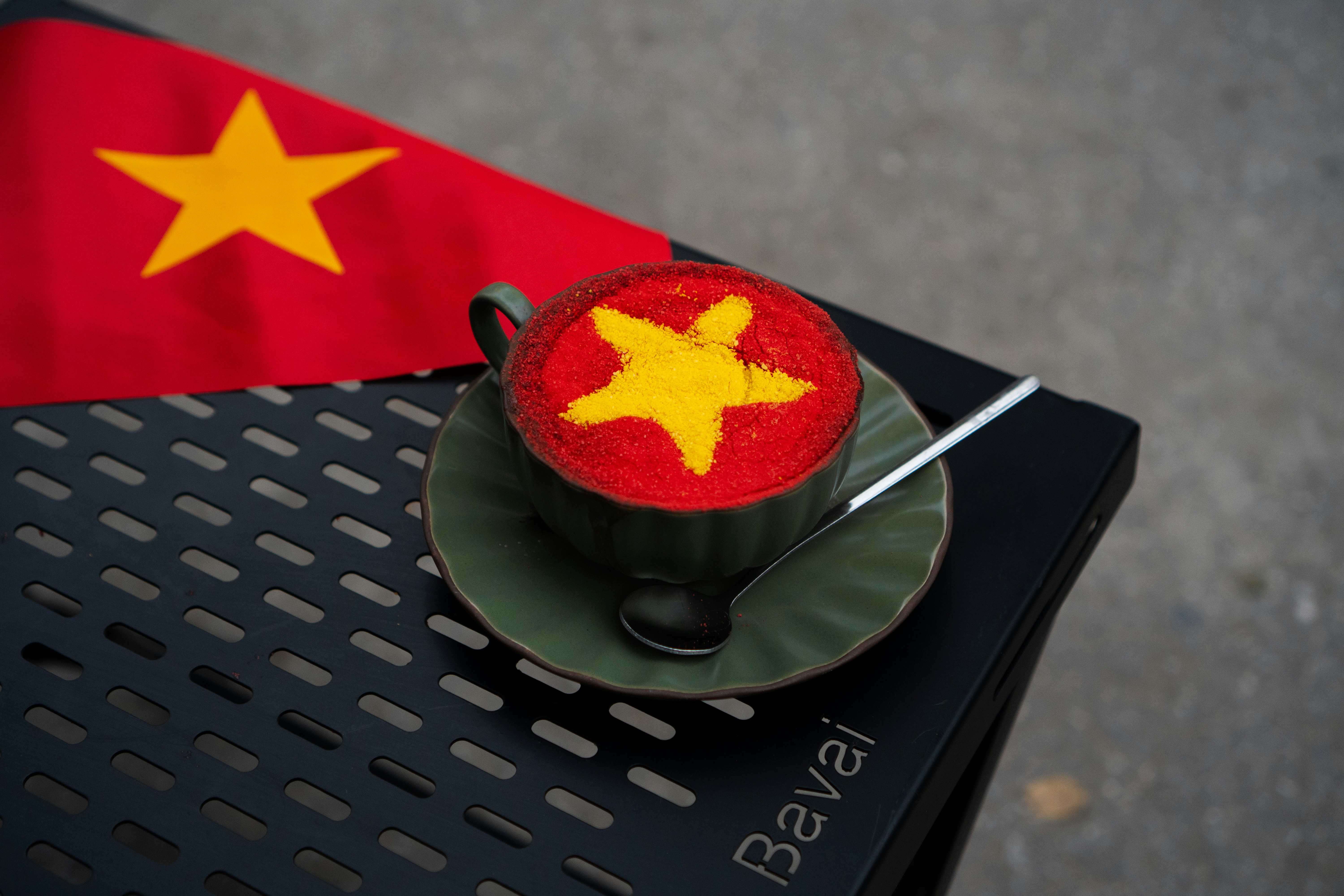 Red Star in a Cup: Vietnamese Coffee on a Perforated Table