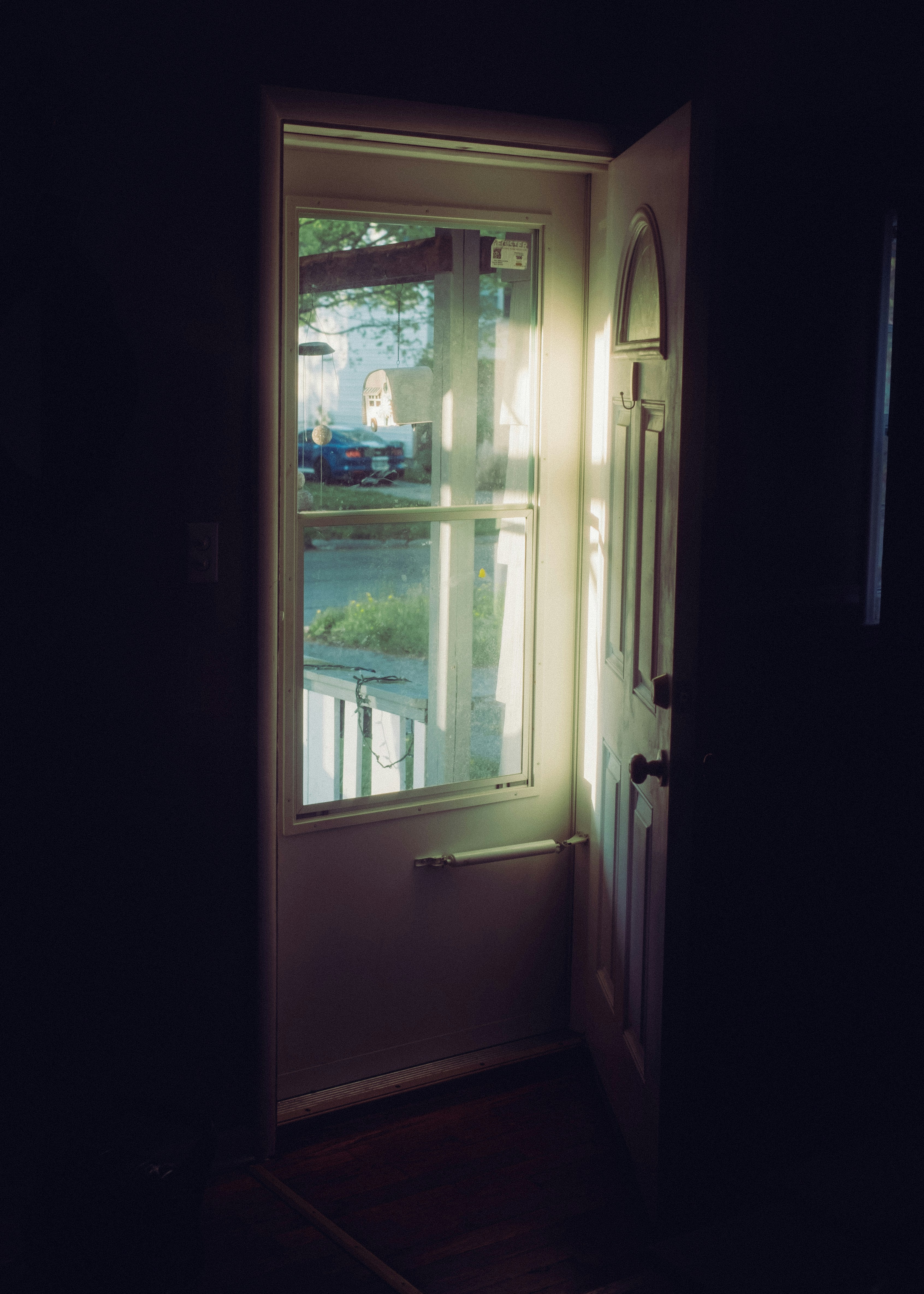 Light at the Threshold: Sunlit Doorway into the Quiet House