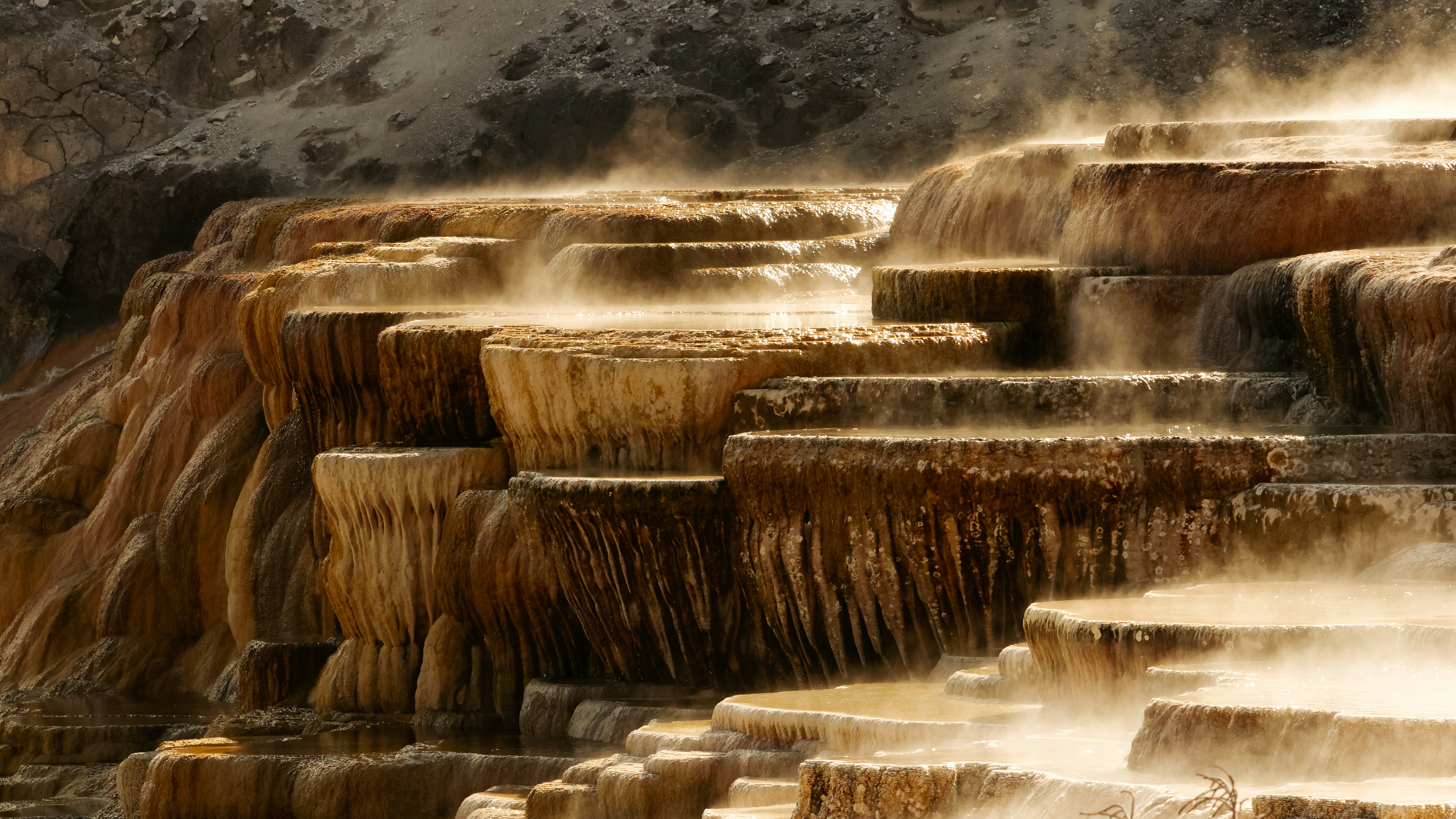 Steam-Kissed Terraces: A Cascade of Golden Steps