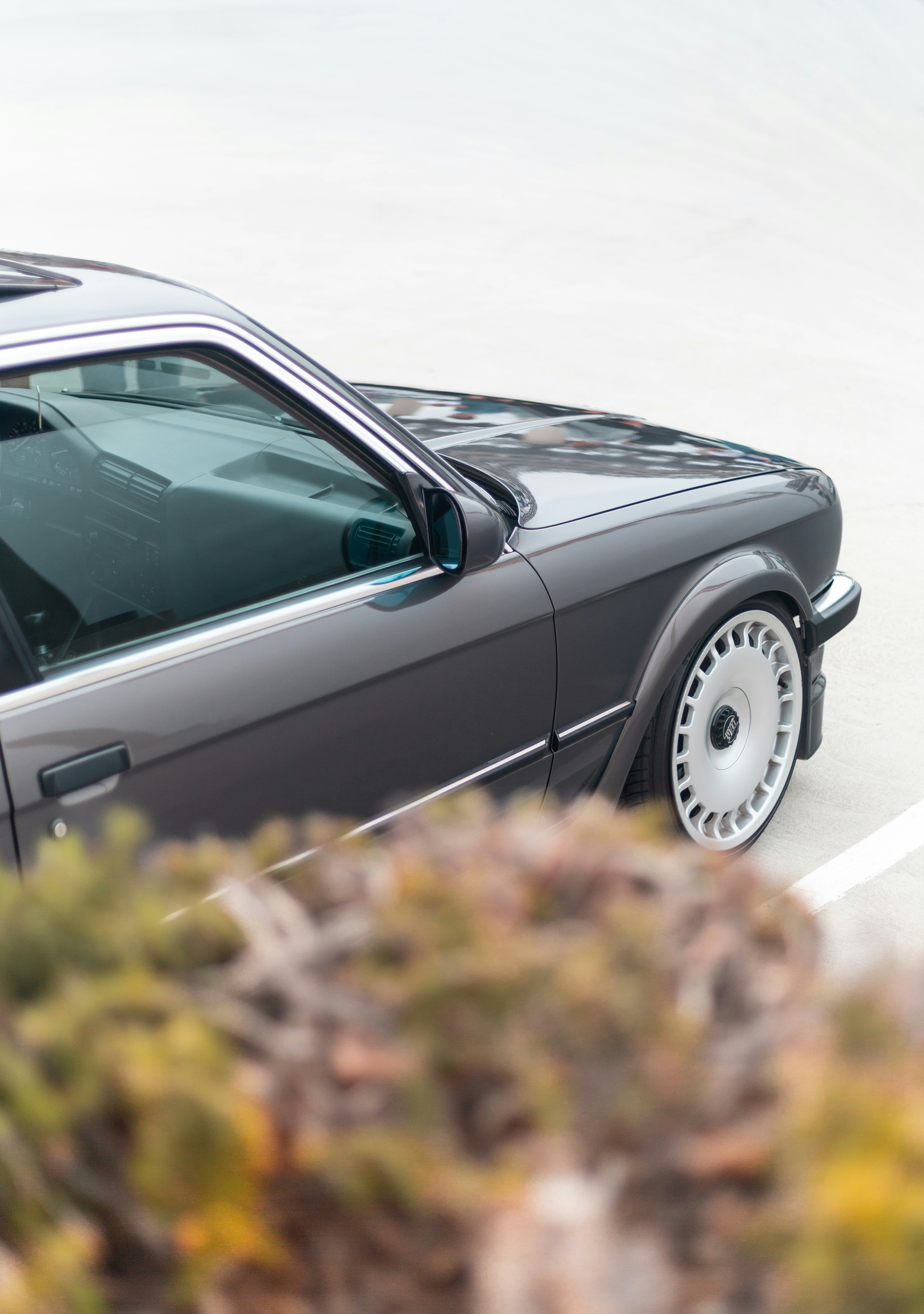 Chrome on the Corner: A Snapshot of a Classic Car Coup in Soft Focus