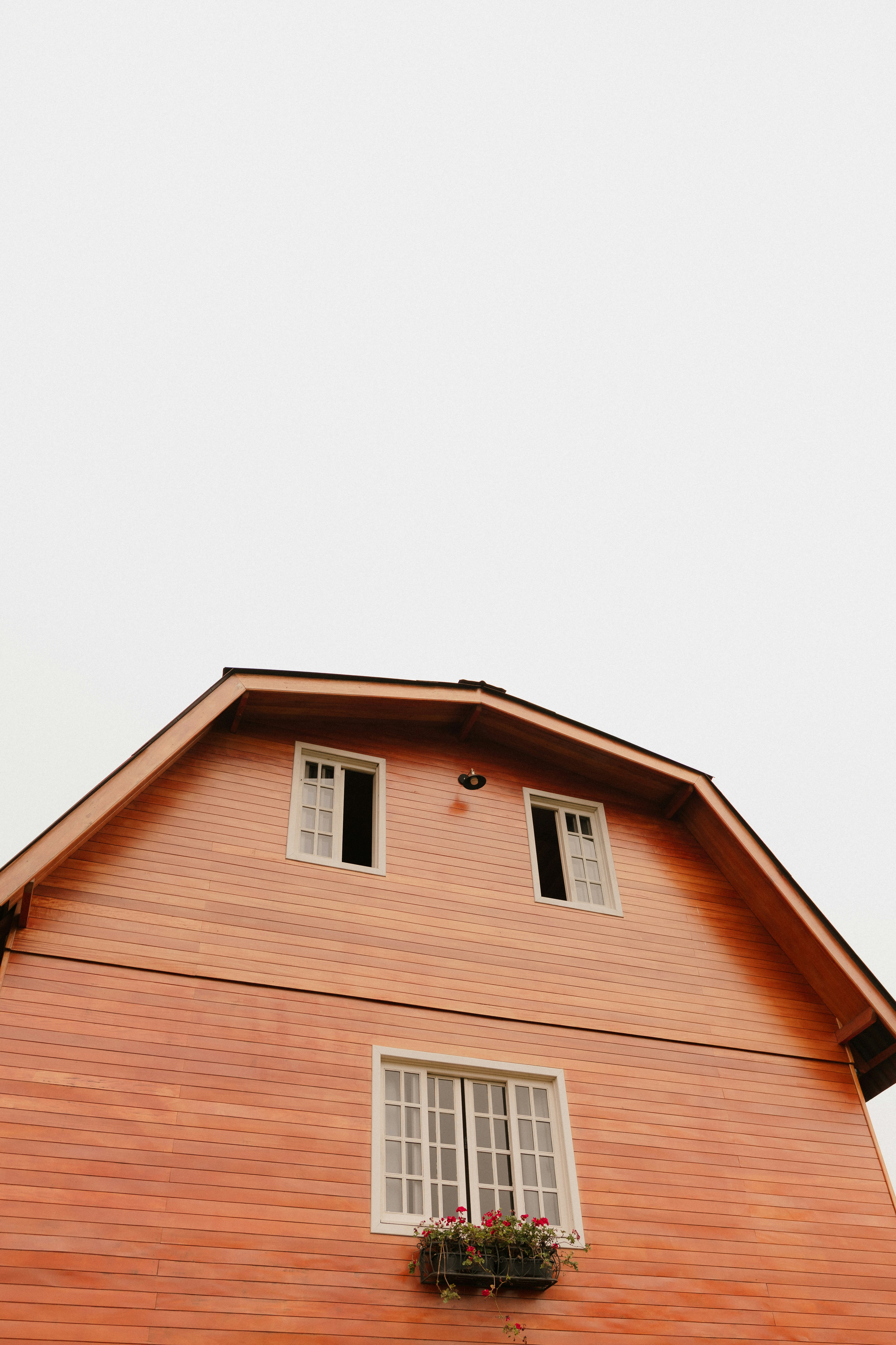 Pastel Brick House Under Soft Skies