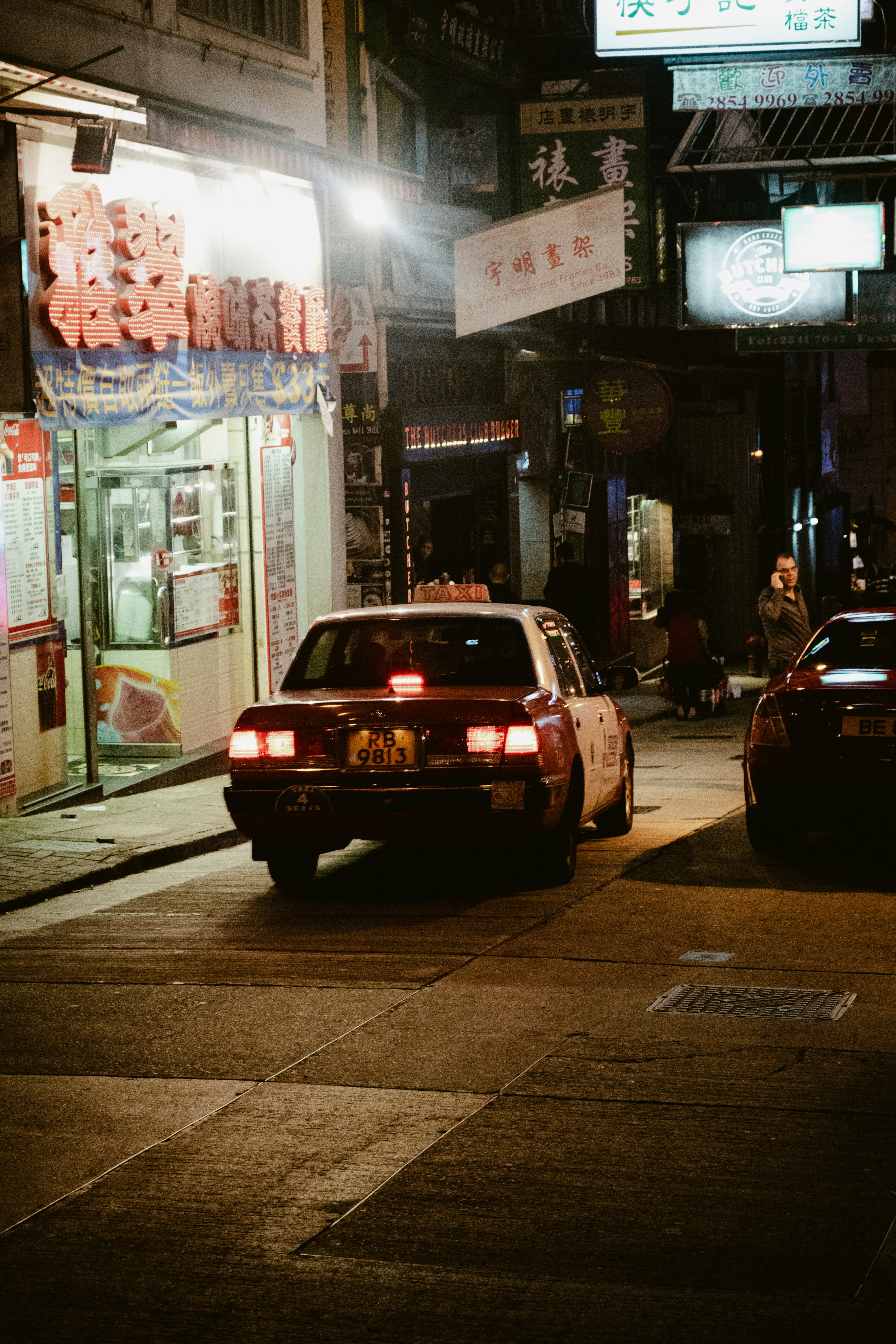 Night Market Taxi: Neon Streets and Quiet Taxi Tail Lights