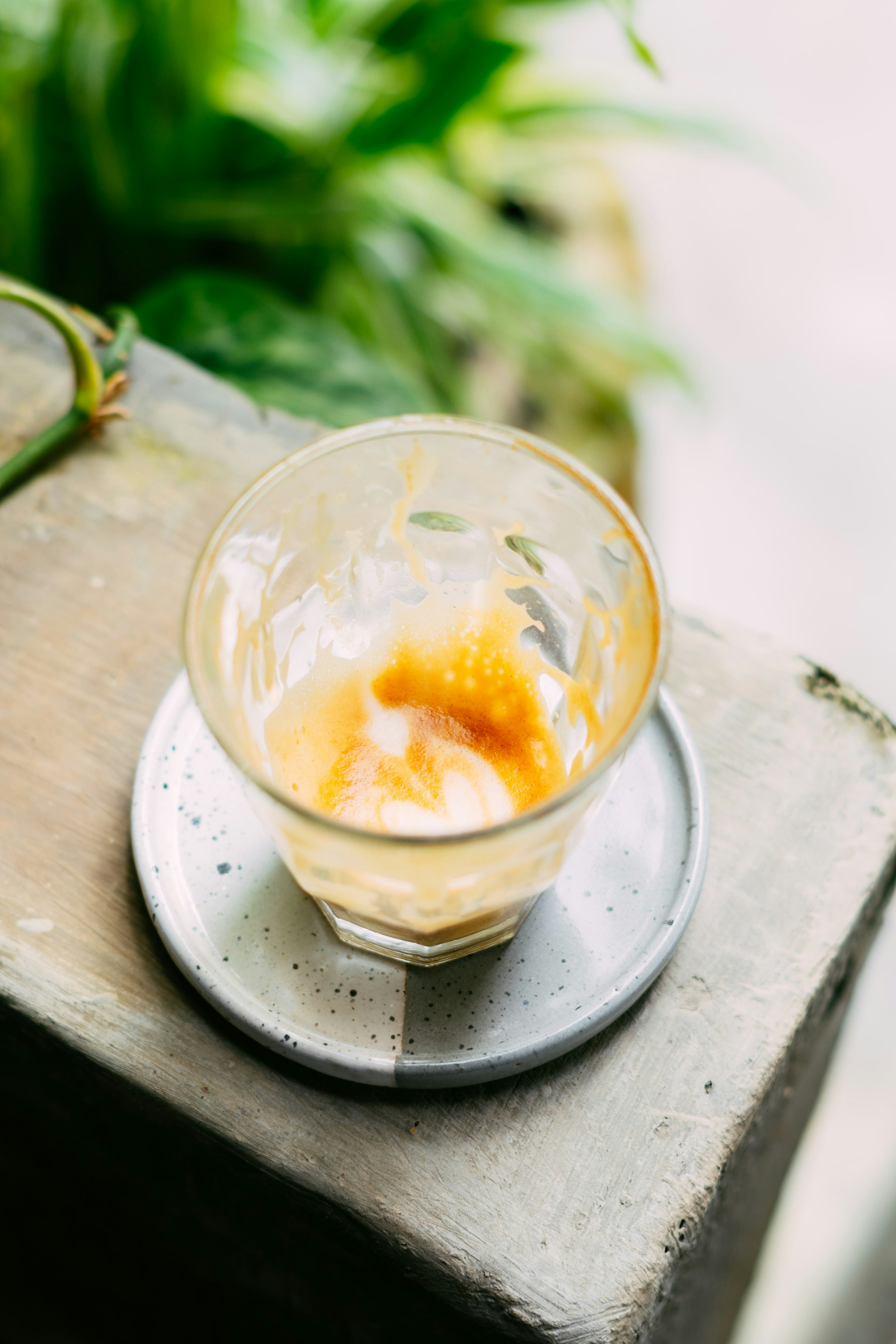 Liquid Ashes: Half-Drunk Cup on a Weathered Table