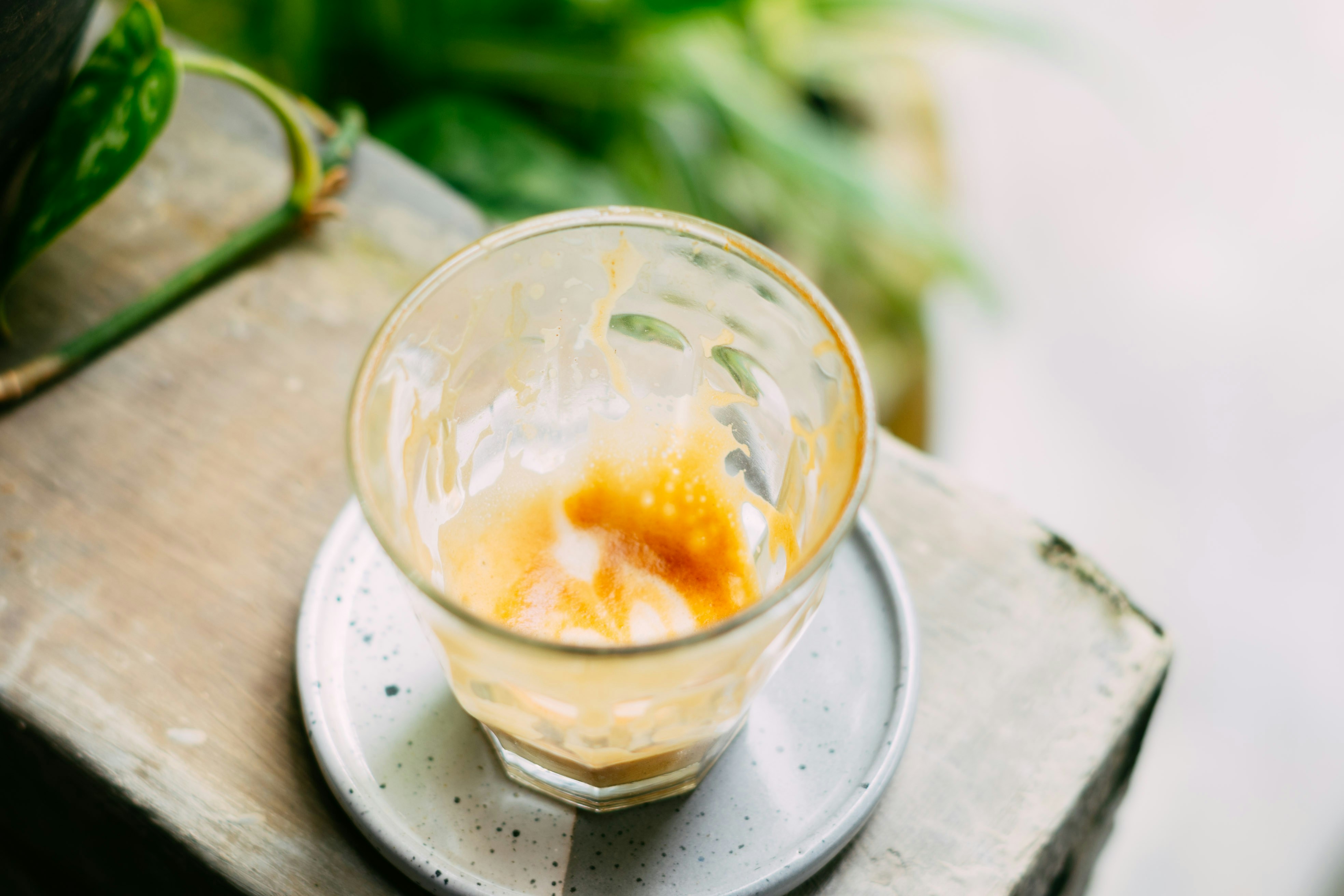 Honeyed Glass: A Shot of Morning Quiet on a Wooden Edge