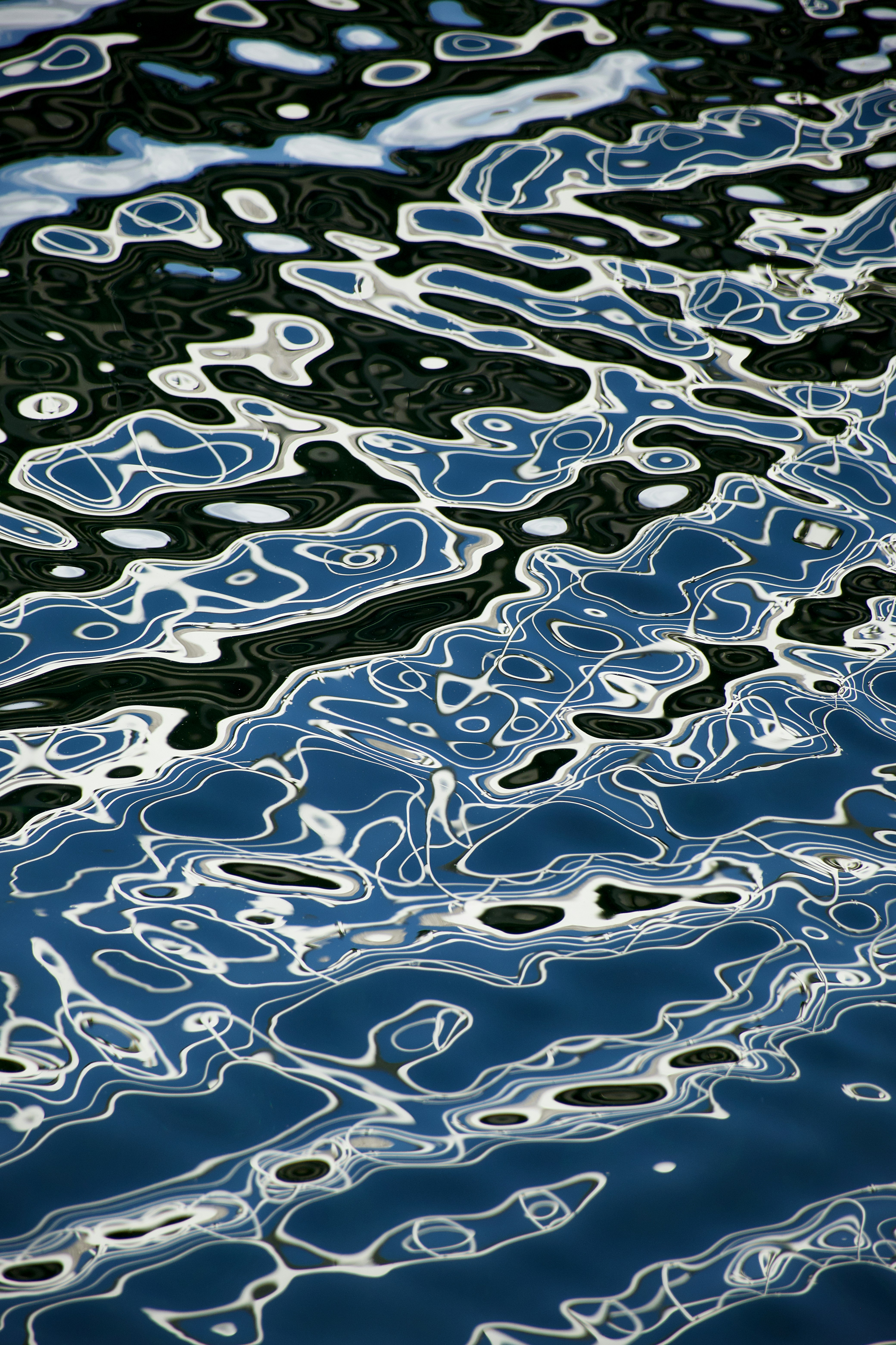 Ripple Portraits: Abstract Reflections on Water