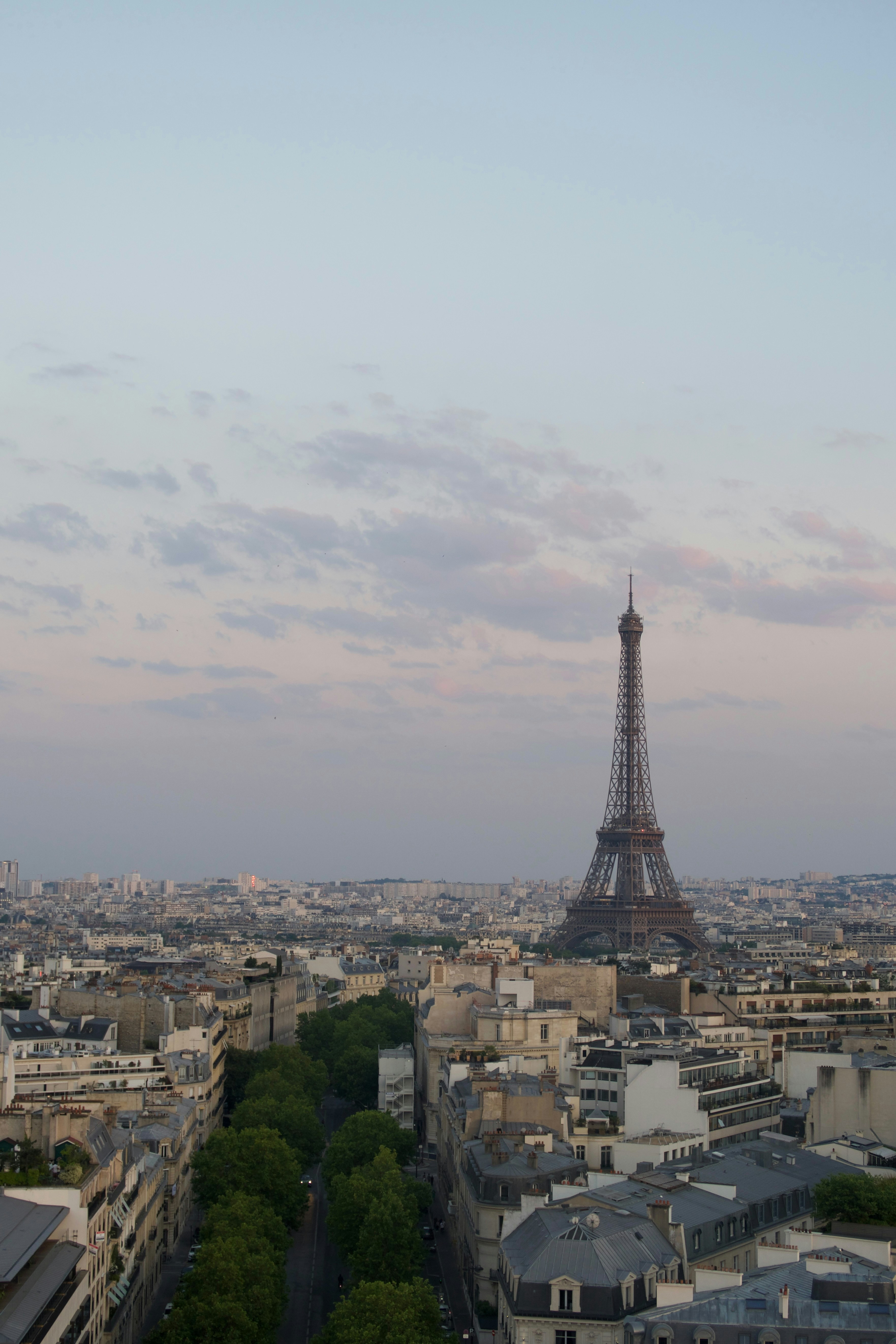 Paris at Dusk: The Eiffel Tower Rising Above a Quiet Cityscape