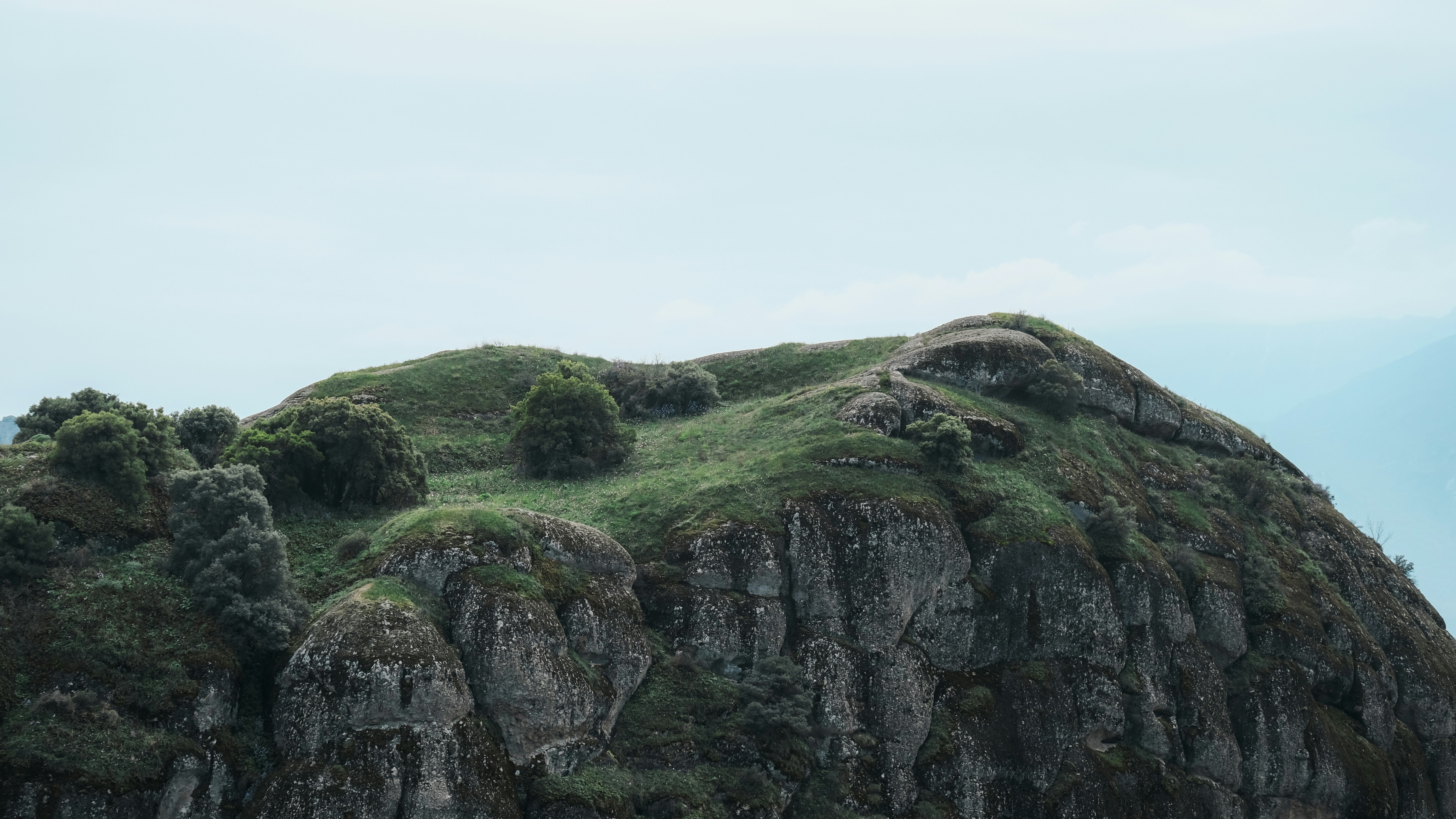 Green Cap atop the Weathered Crag