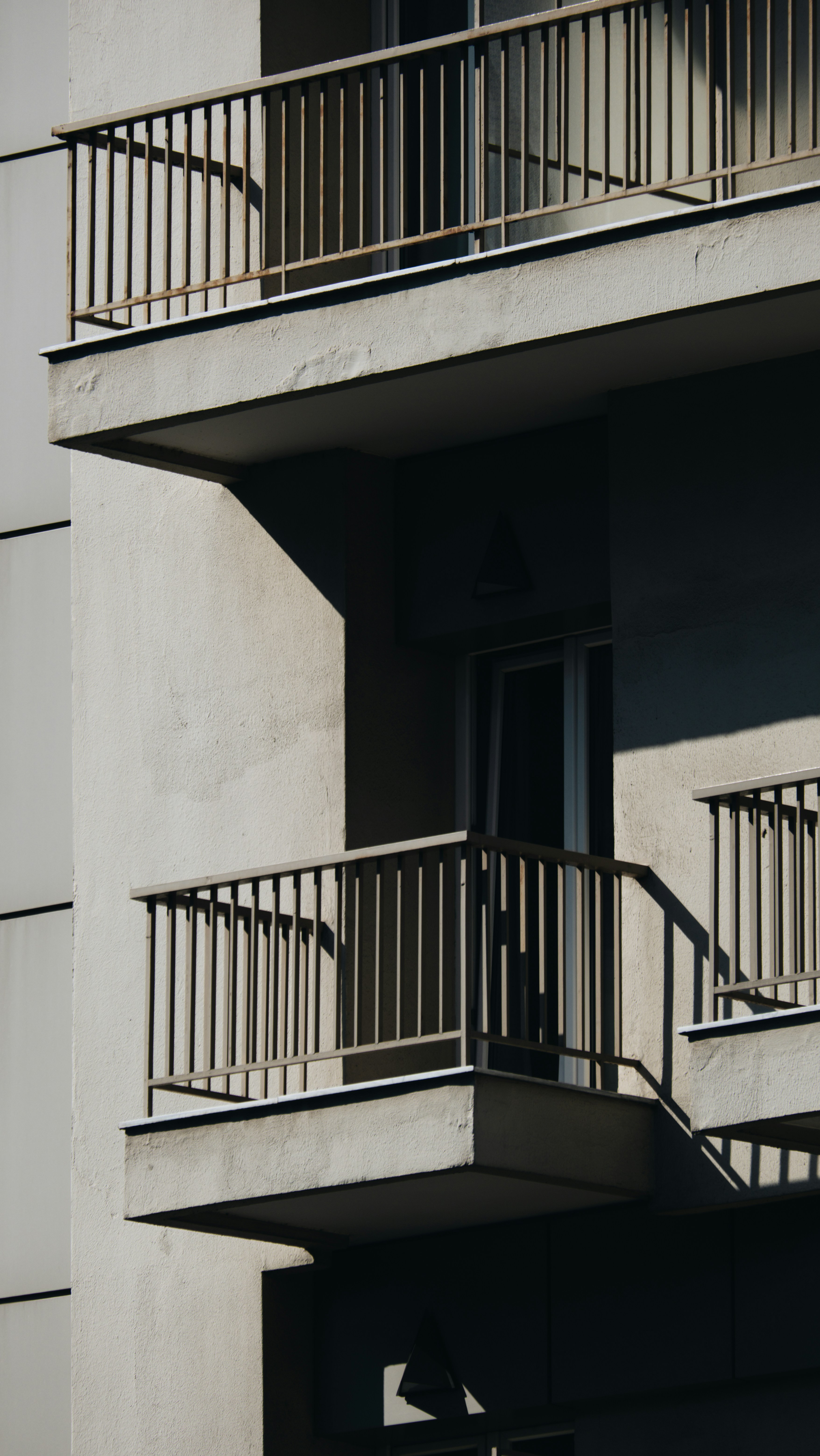 Concrete Balcony Geometry in Dappled Light