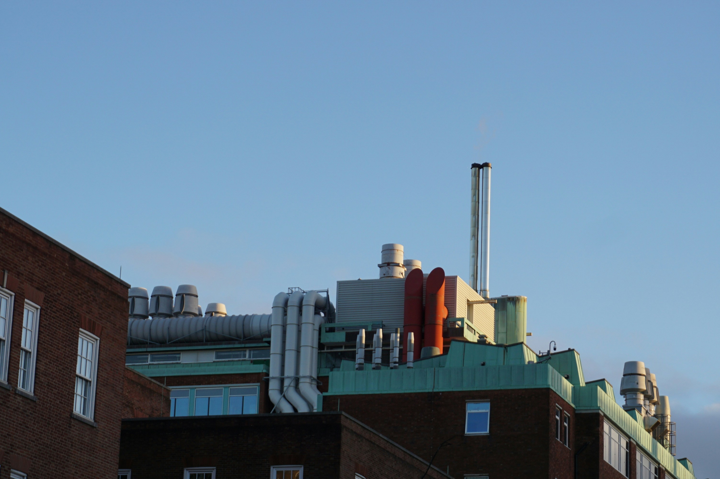 Rooftop Machinery Against a Clear Sky