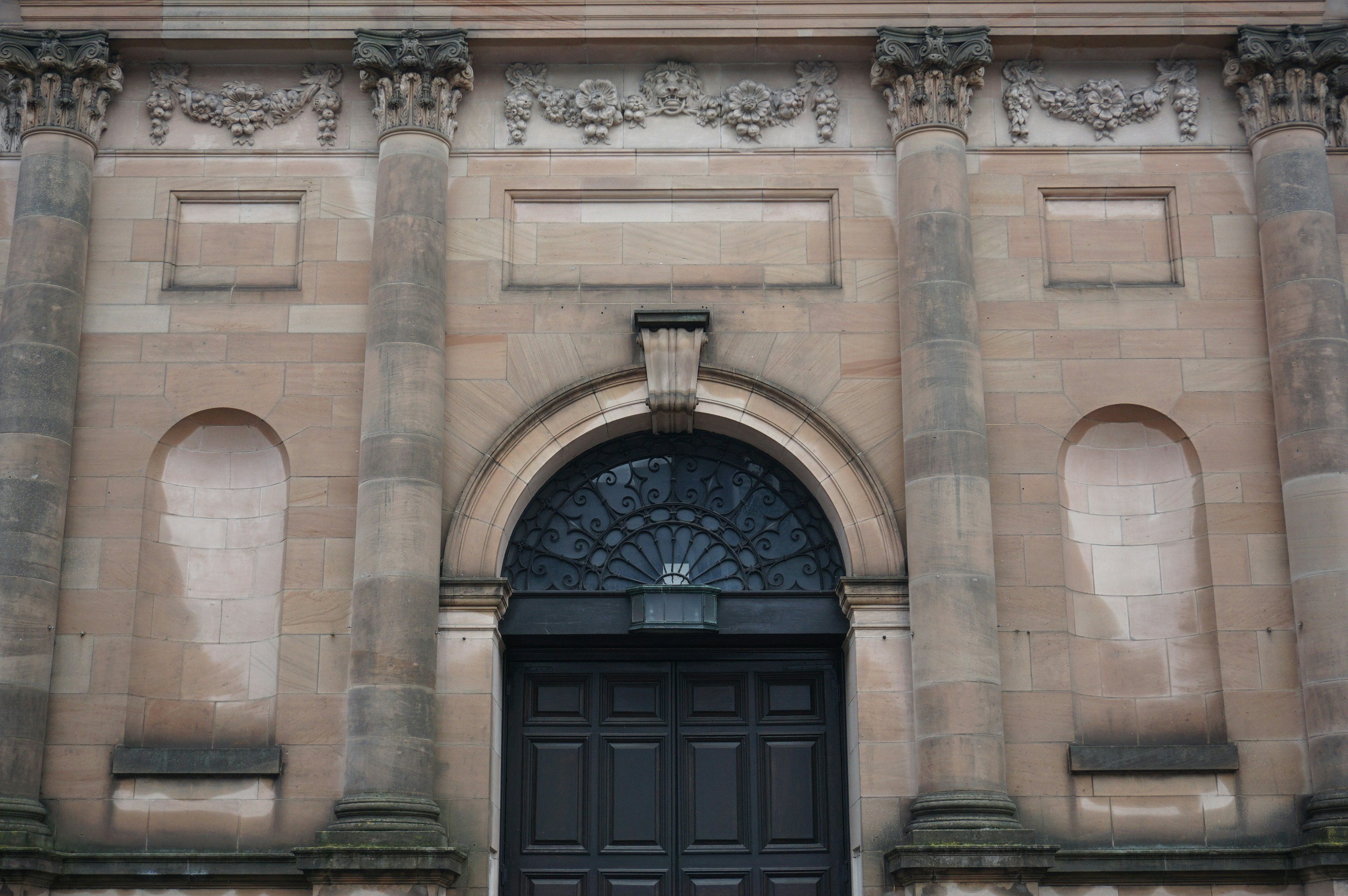 Granite Archway of Silence: A Neoclassical Facade