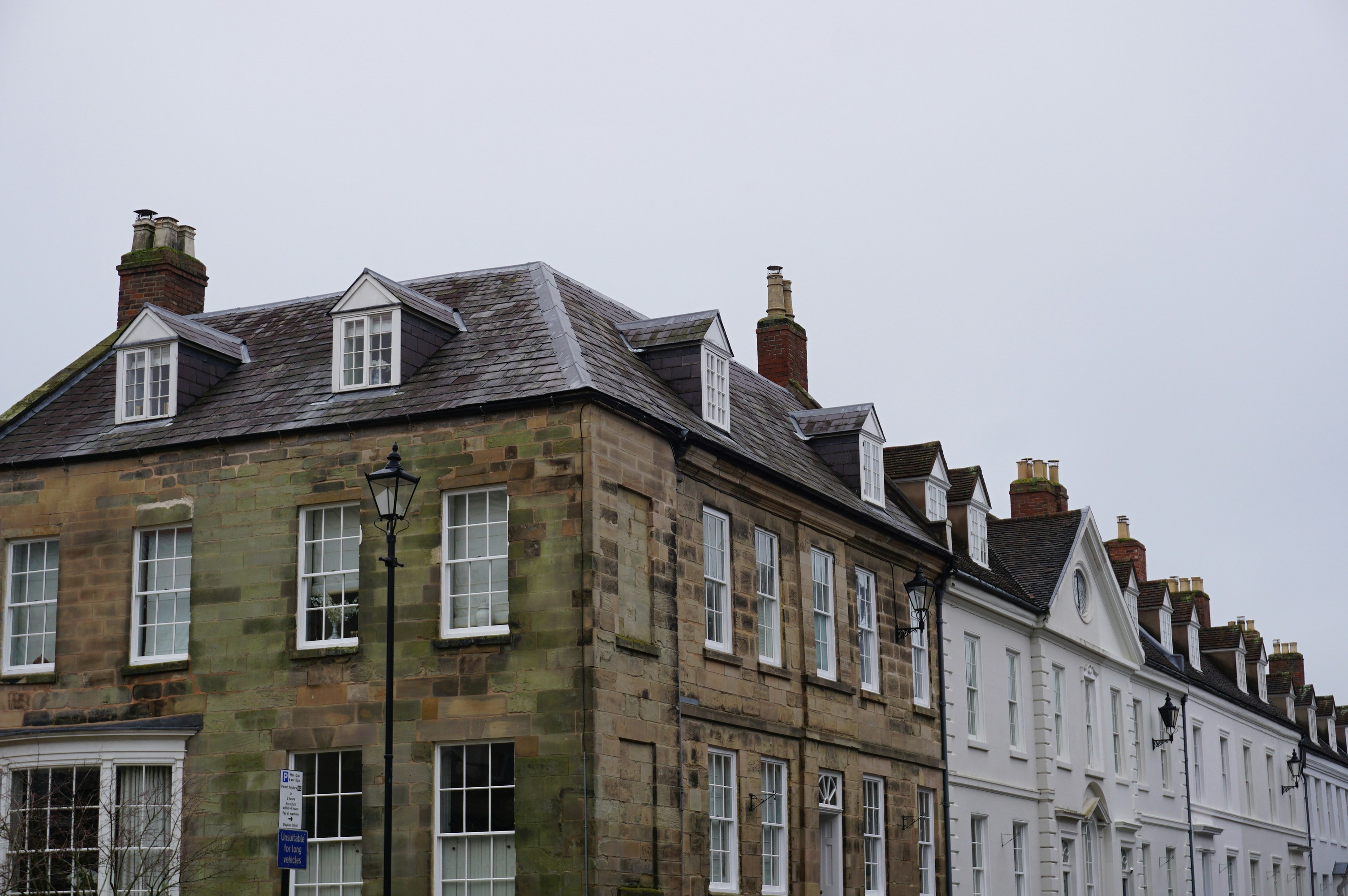 Row of Georgian Townhouses under a Pale Winter Sky