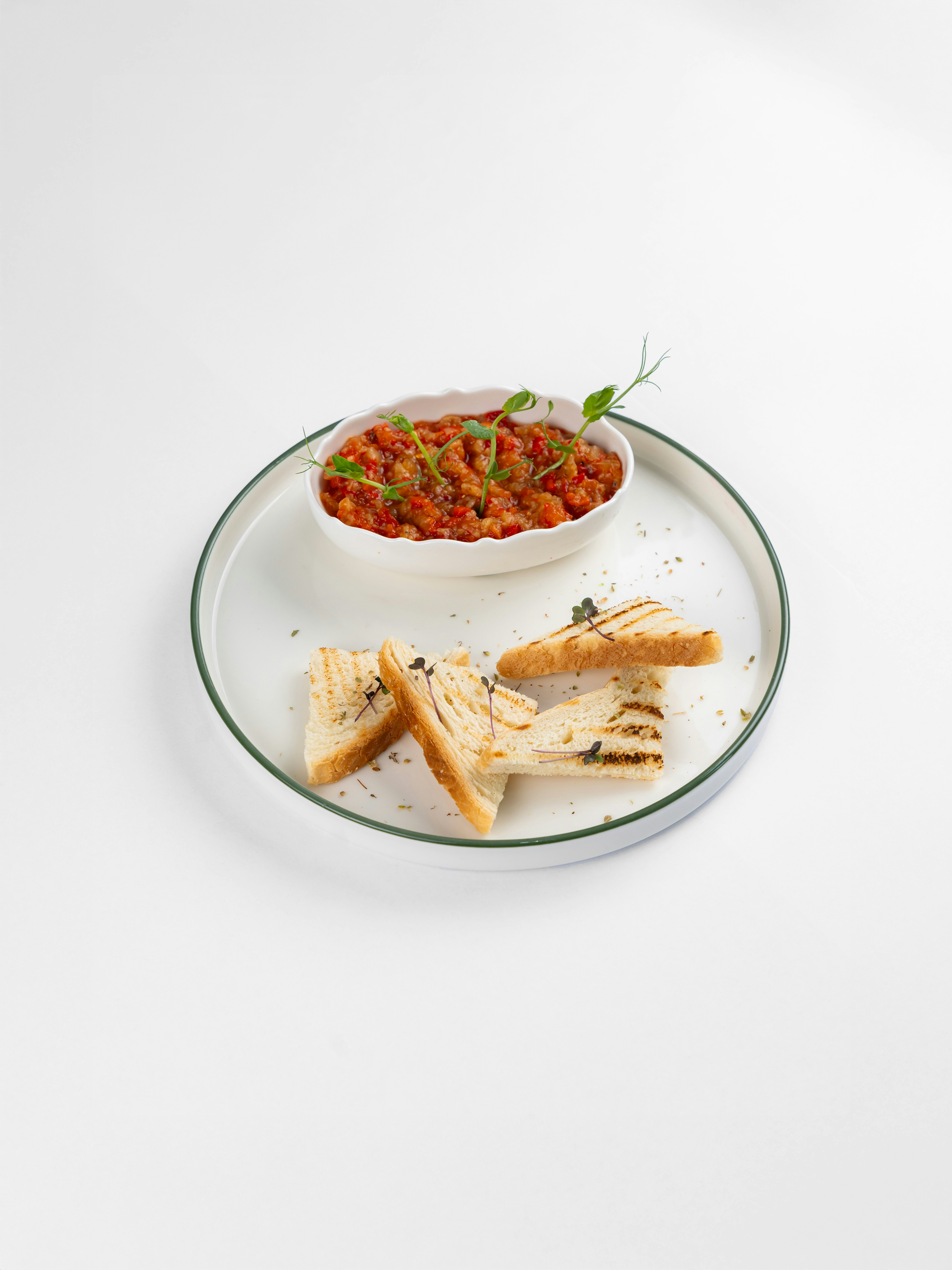 Minimalist Plate: Rustic Tomato Relish and Grilled Bread on White