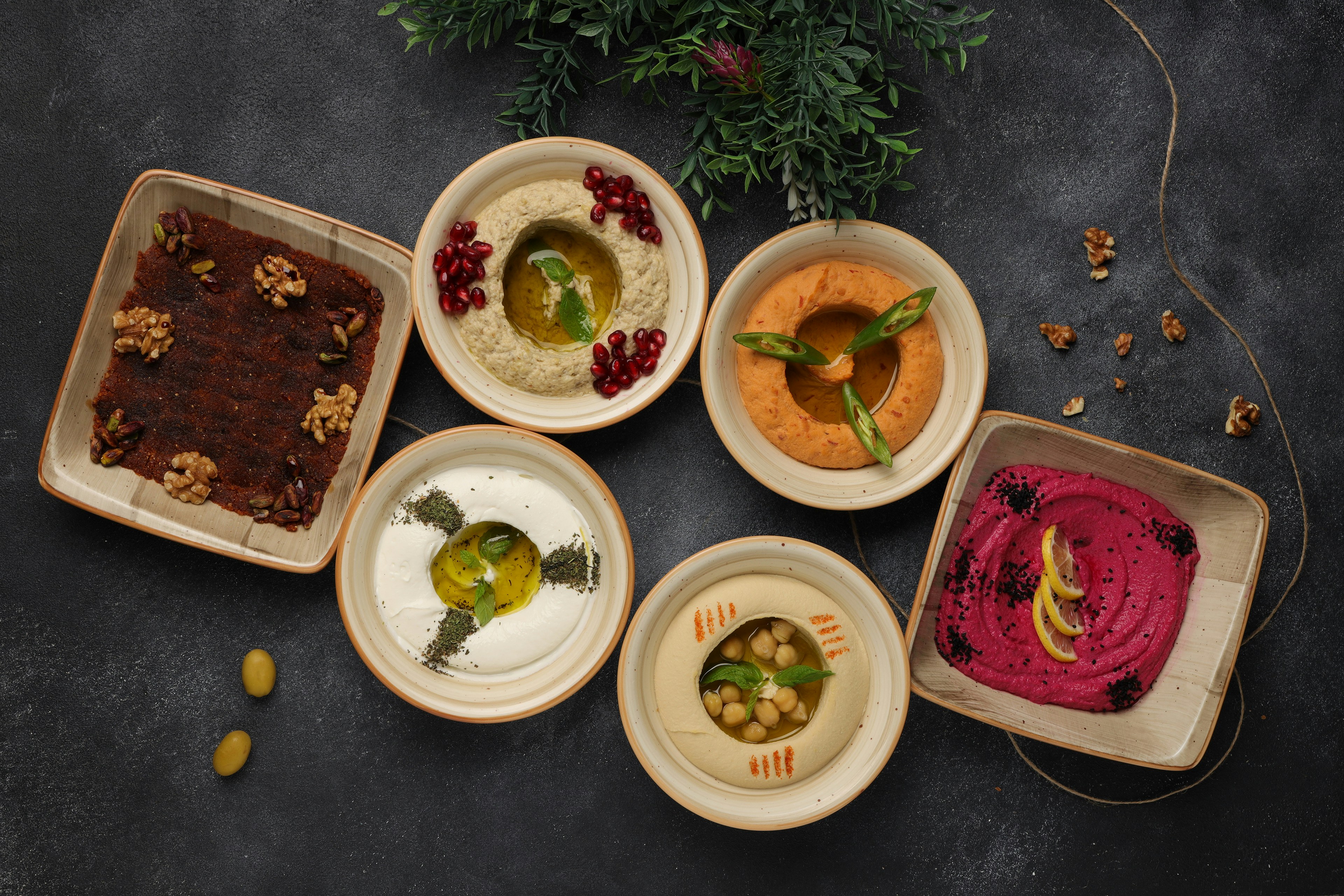 A Palette of Nordic Dips: Colorful Sauces Arranged in Ceramic Bowls