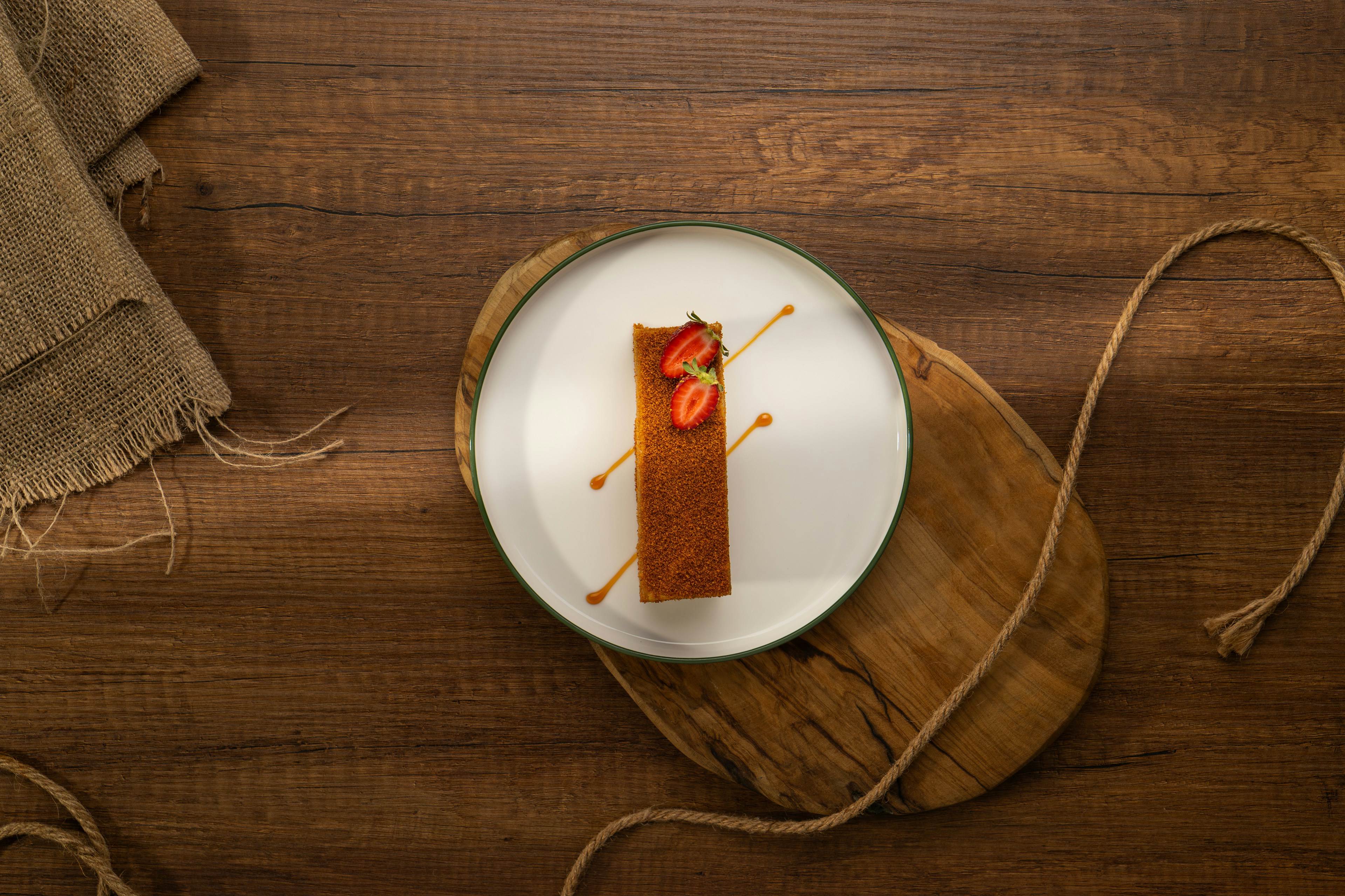 A Lone Rectangular Treat on a Wooden Stage