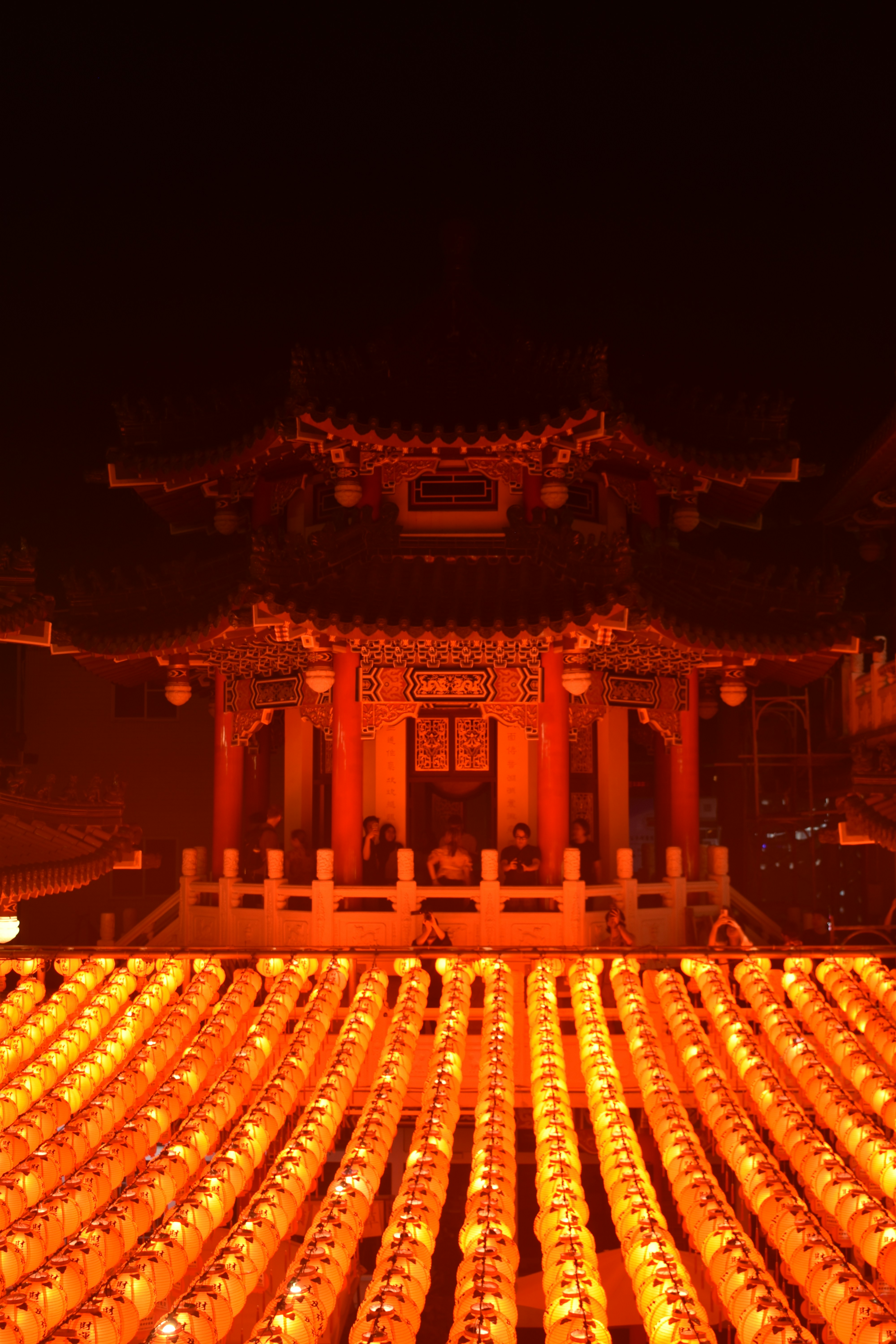 Lantern-lit Gables: Night Portrait of a Traditional Pavilion