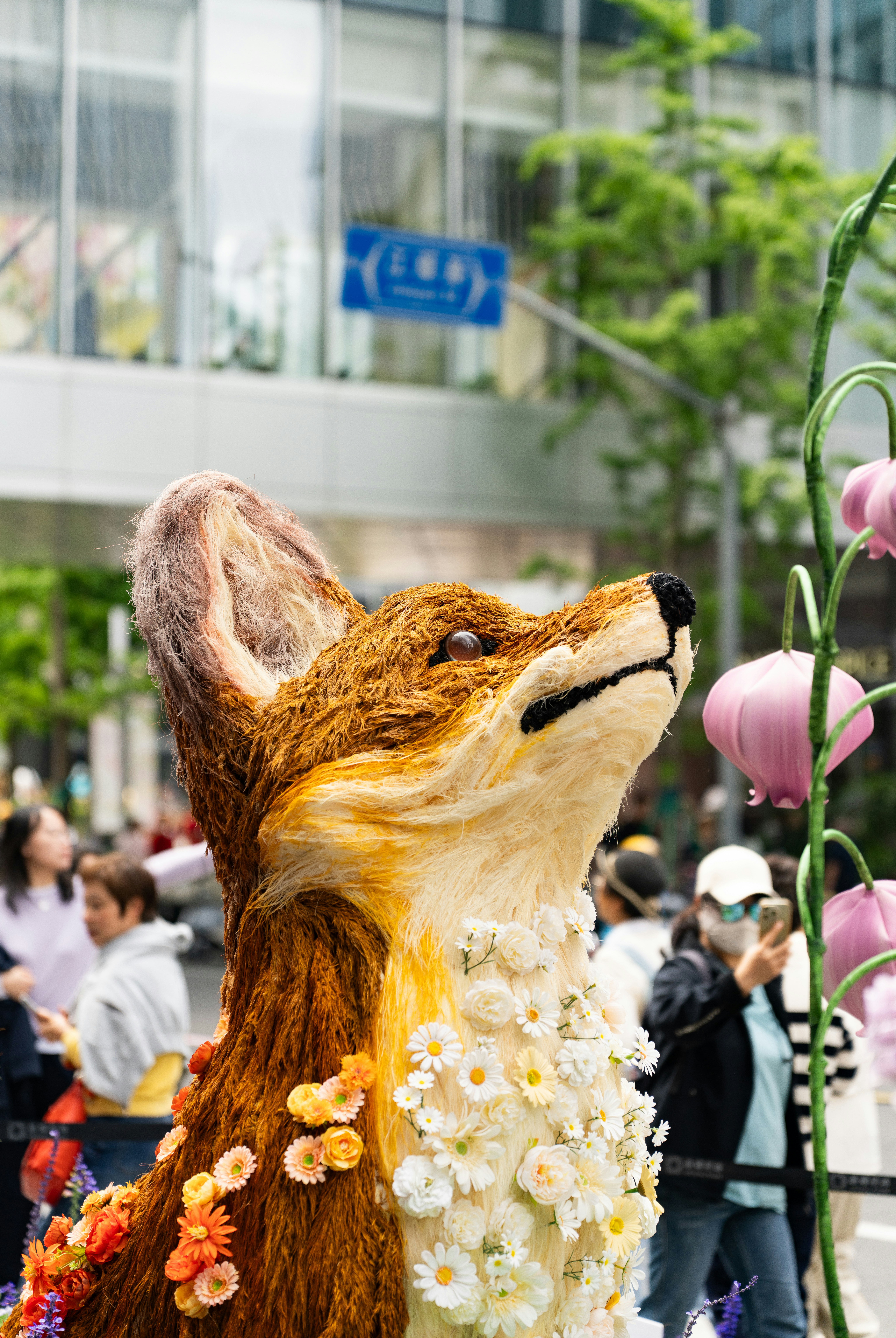 Floral-Furred Shrine: A Cosplay Fox Amid Urban Bloom